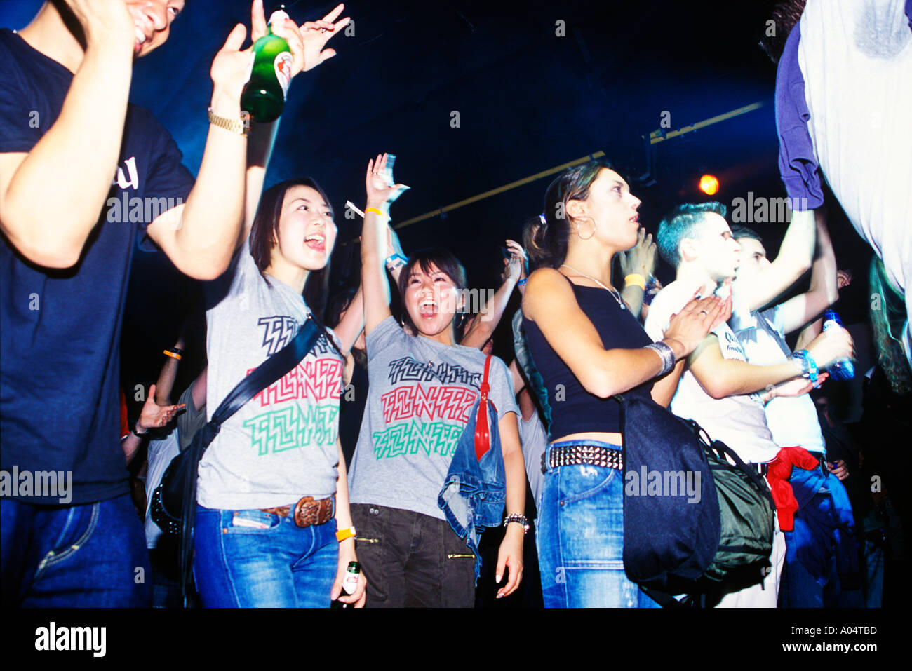 Asian girls in crowd at Trufest Canvas London Stock Photo - Alamy