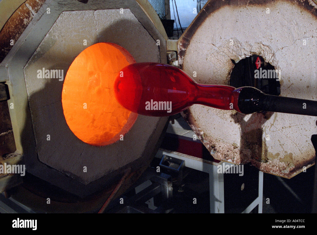 Professional glass blower forming vase Stock Photo - Alamy