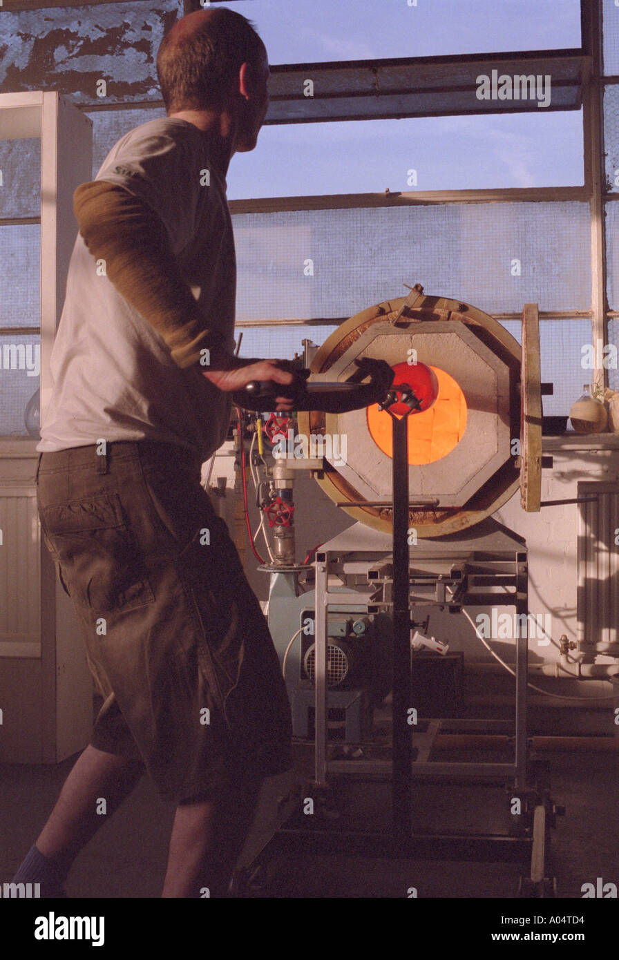 Professional glass blower forming vase Stock Photo - Alamy