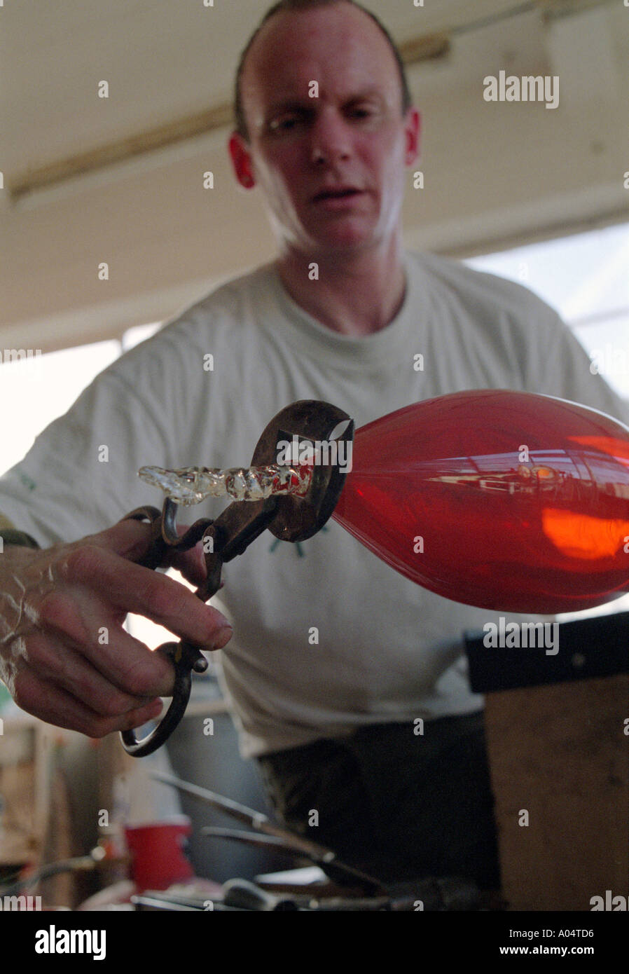 Professional glass blower forming hi-res stock photography and images ...