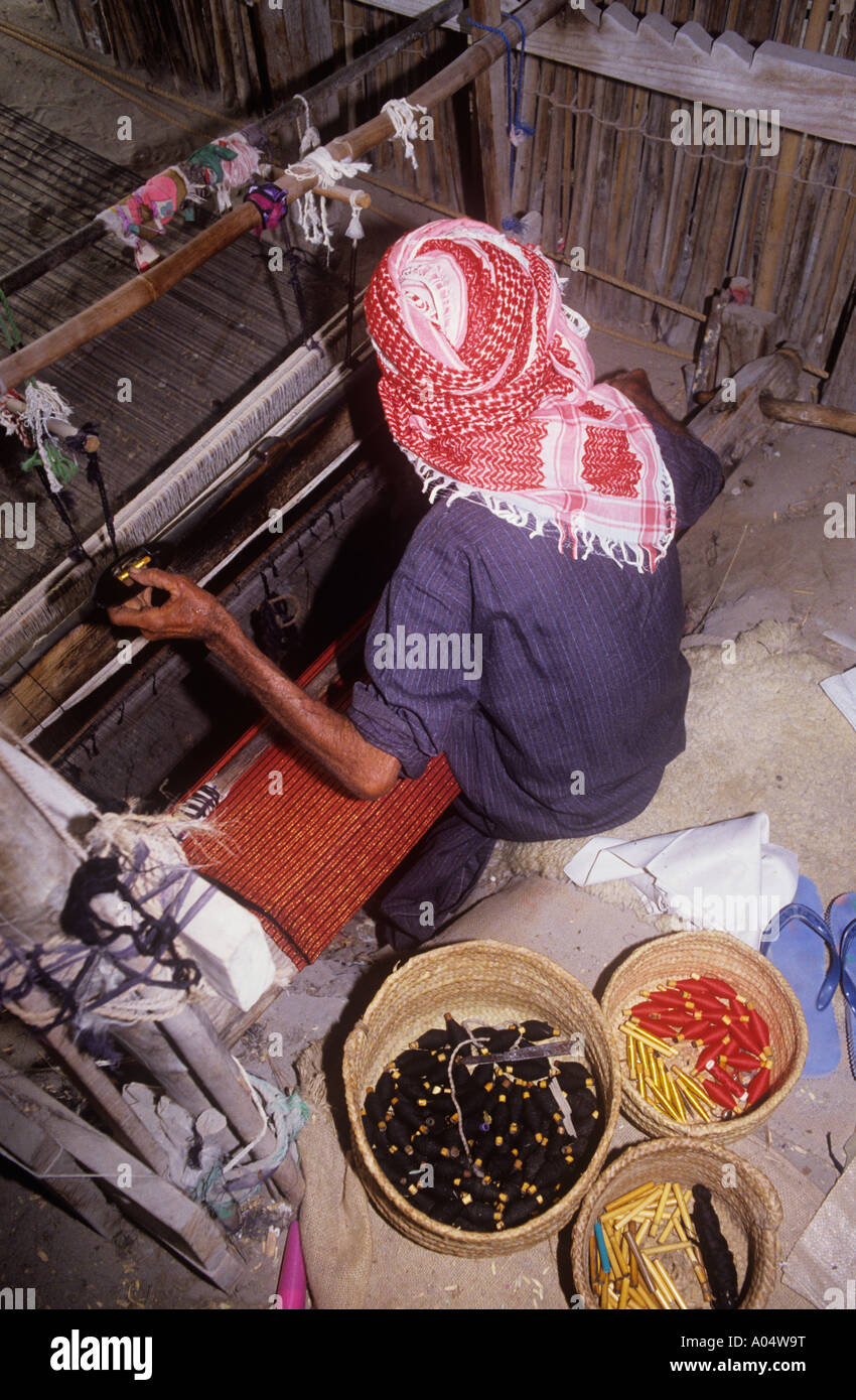 A traditional loom with weaver in Bahrain Stock Photo - Alamy