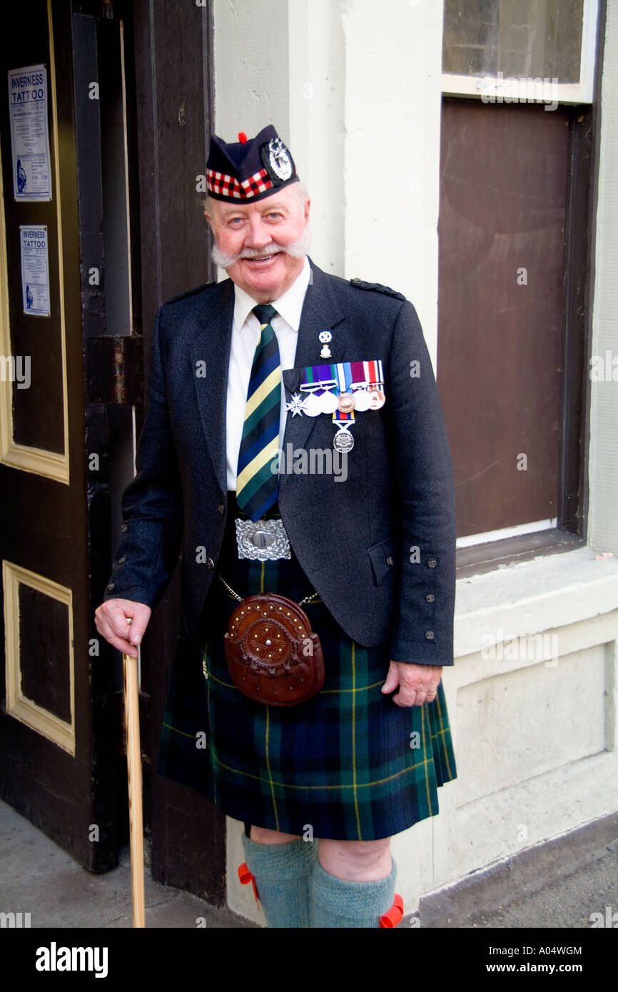 Man in traditional kilt wool outfit at the Highland Tatoo games in ...