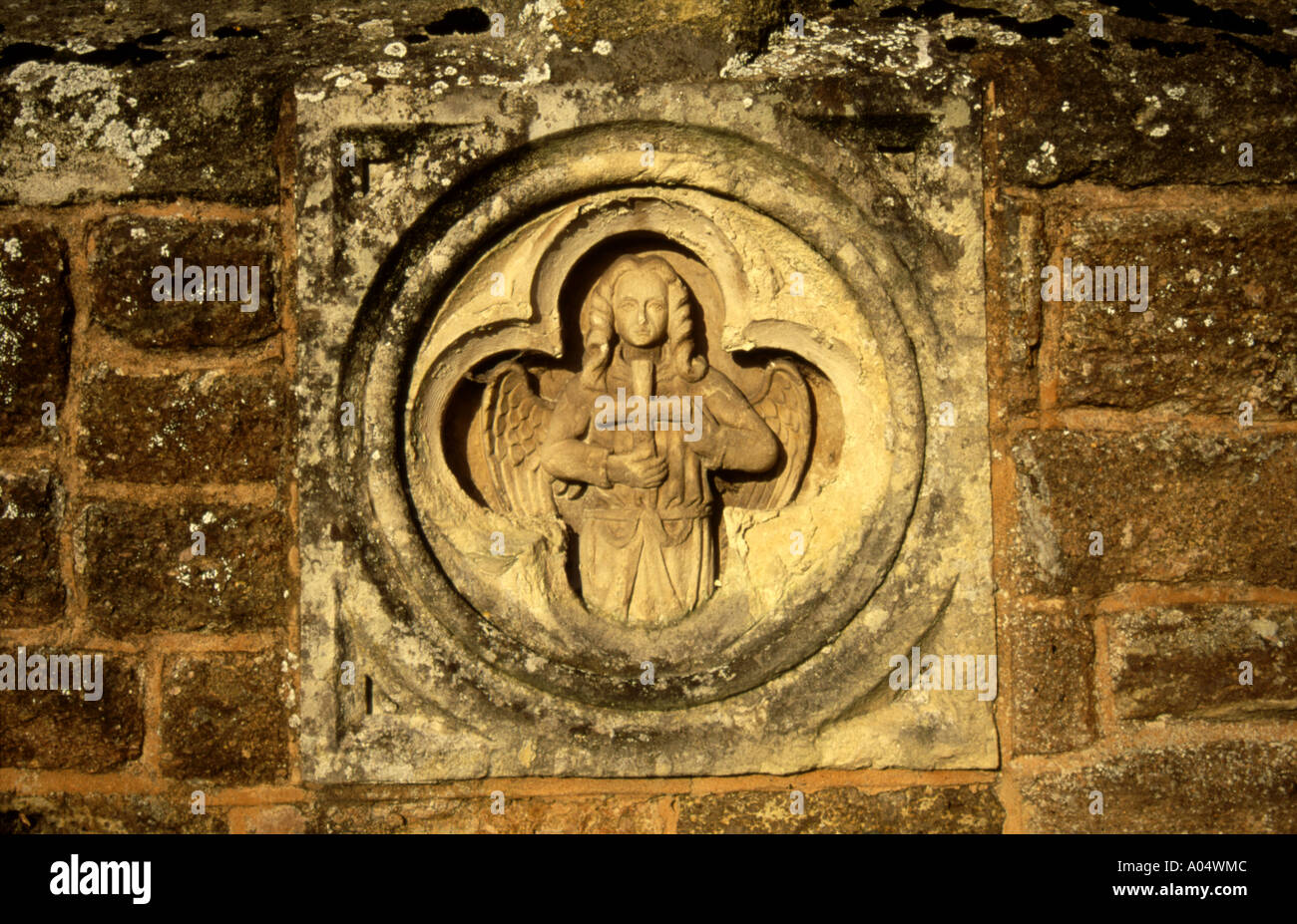 Stone carved angel Stock Photo - Alamy