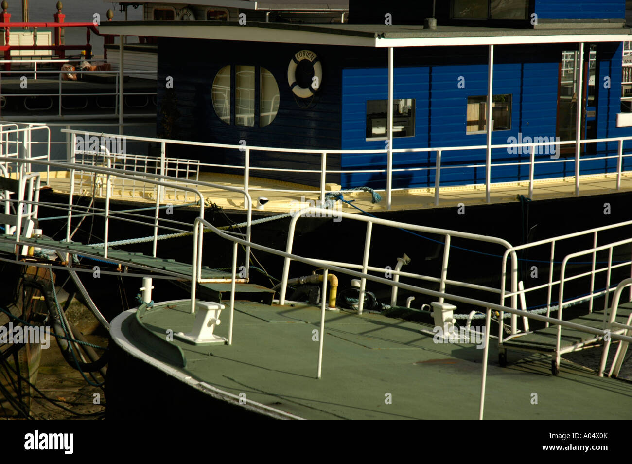 Colourful houseboats on the River Thames near Cheyne Walk Chelsea ...
