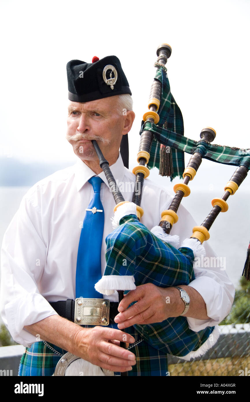 Colorful outfit and personality of bag pipe player at the Loch Ness ...