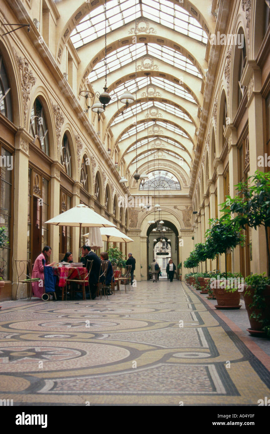 Passageway and glass ceiling of the gallery Vivienne in Paris, France ...