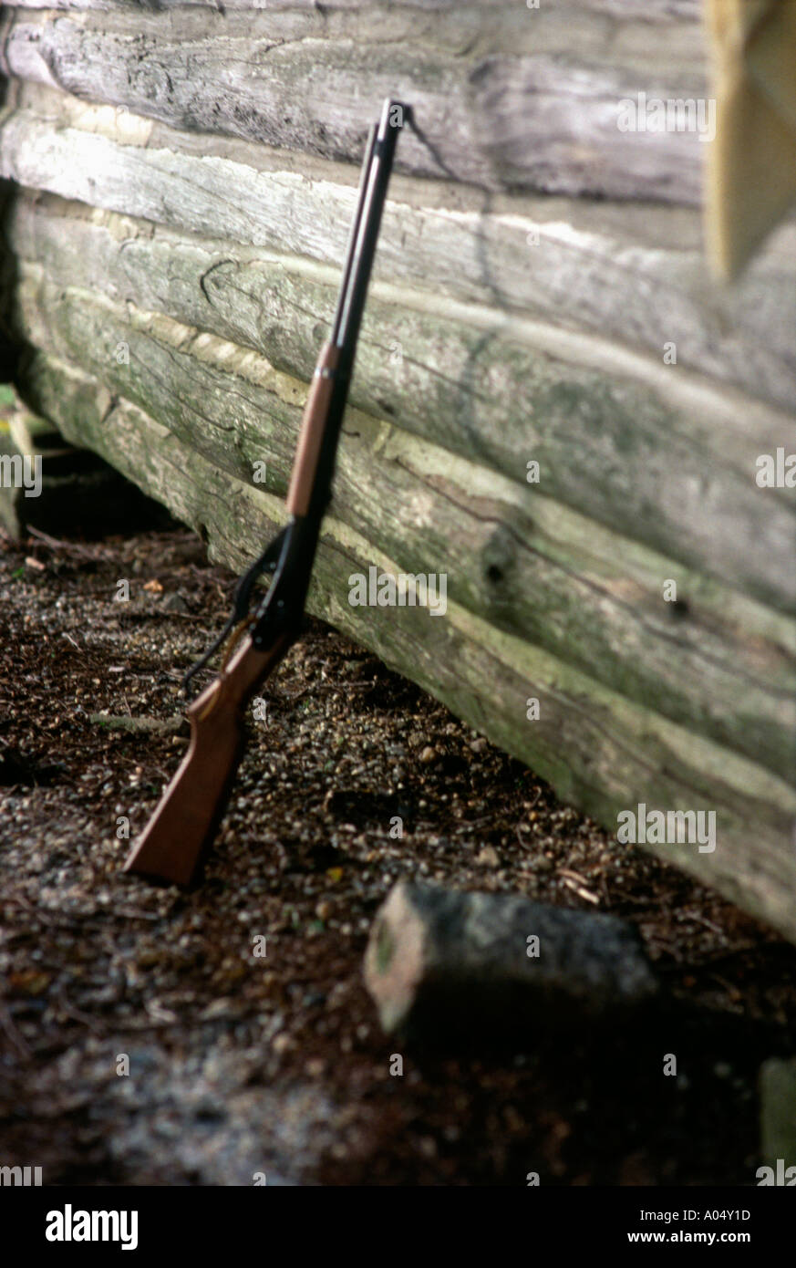 gun against wall Stock Photo - Alamy