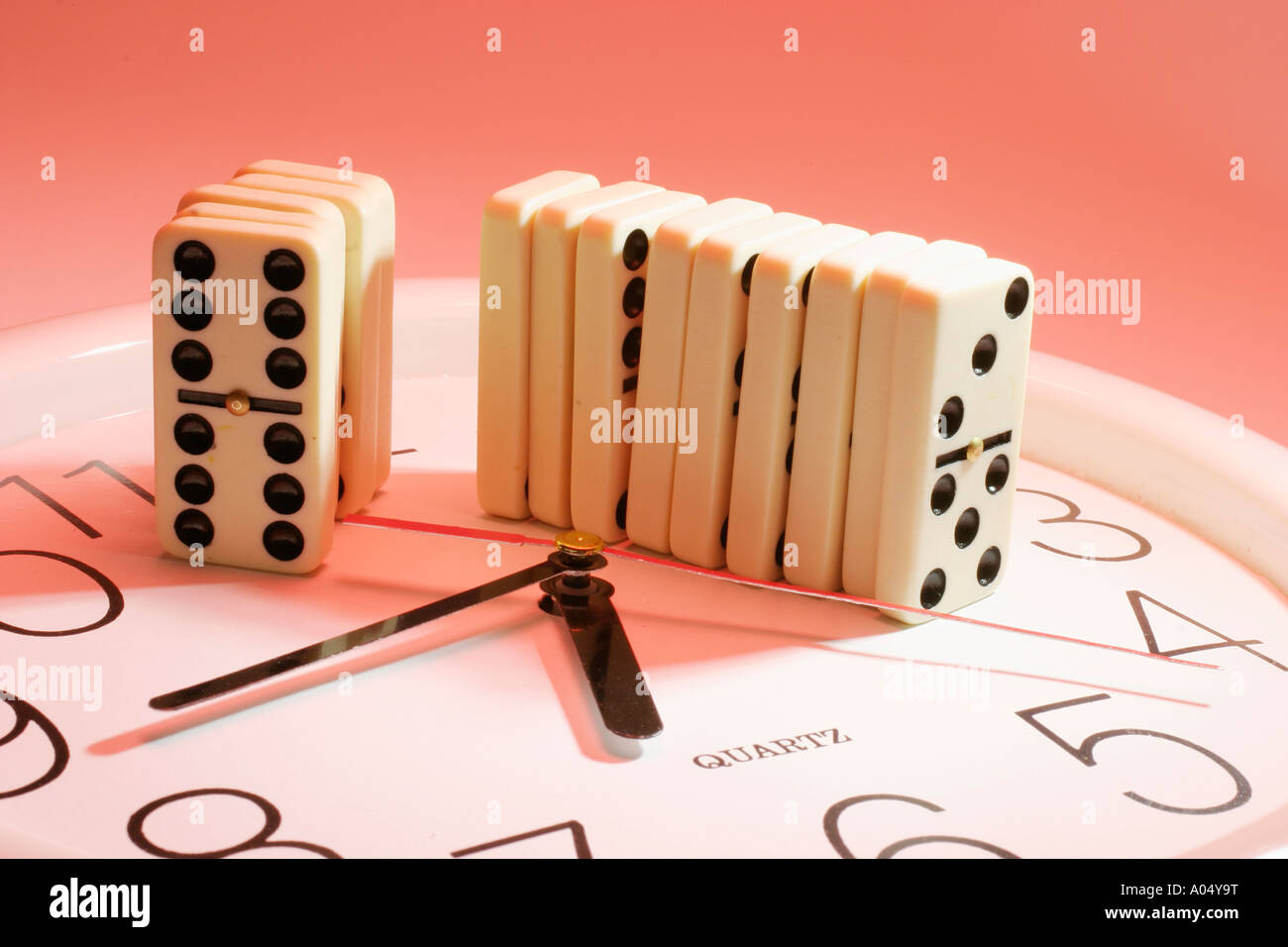 Dominoes on Clock Stock Photo - Alamy