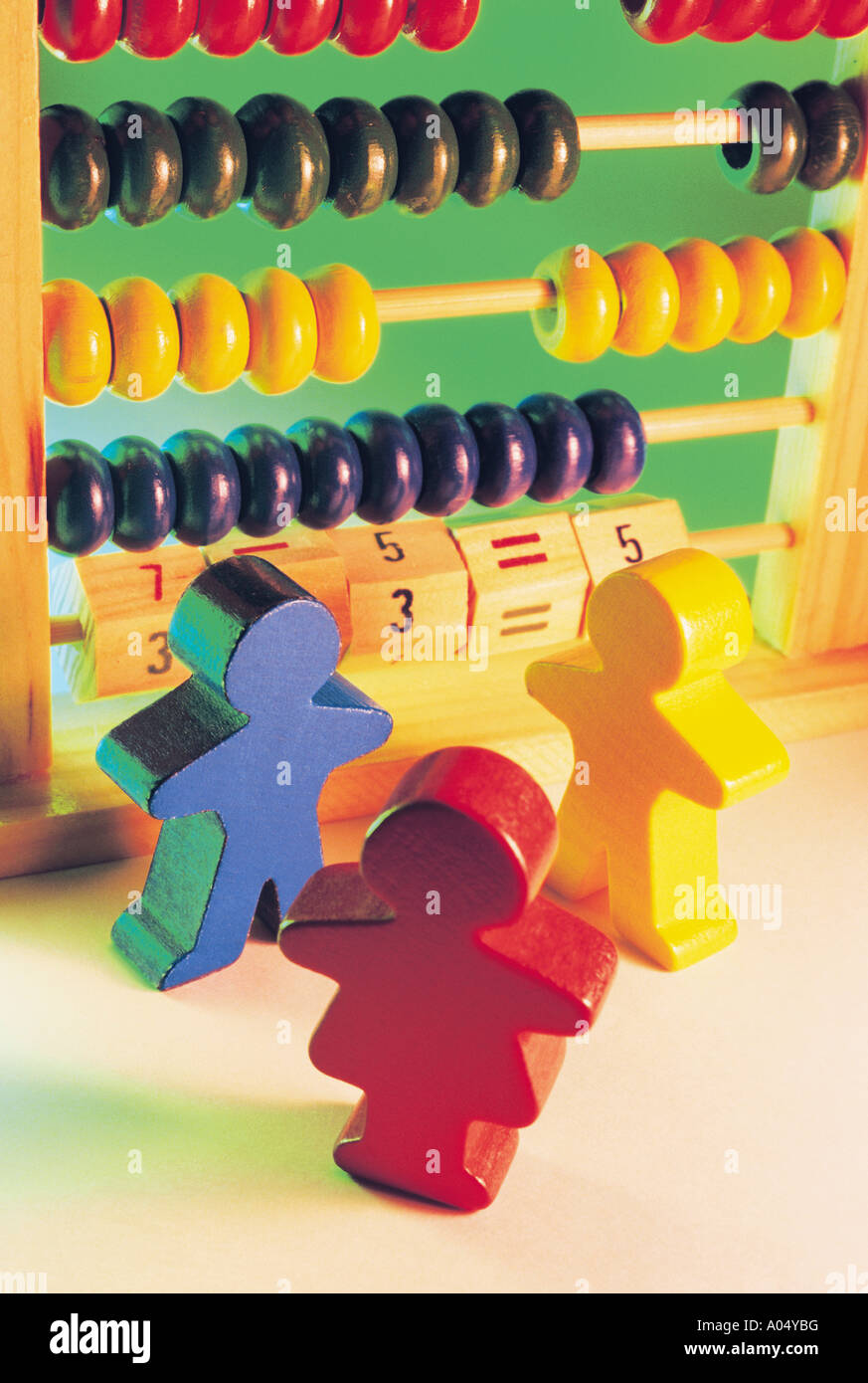 Wooden Children Figures and Toy Abacus Stock Photo - Alamy