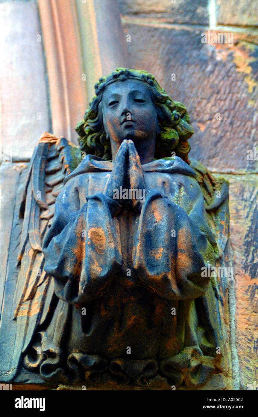 angel stone detail praying Stock Photo - Alamy
