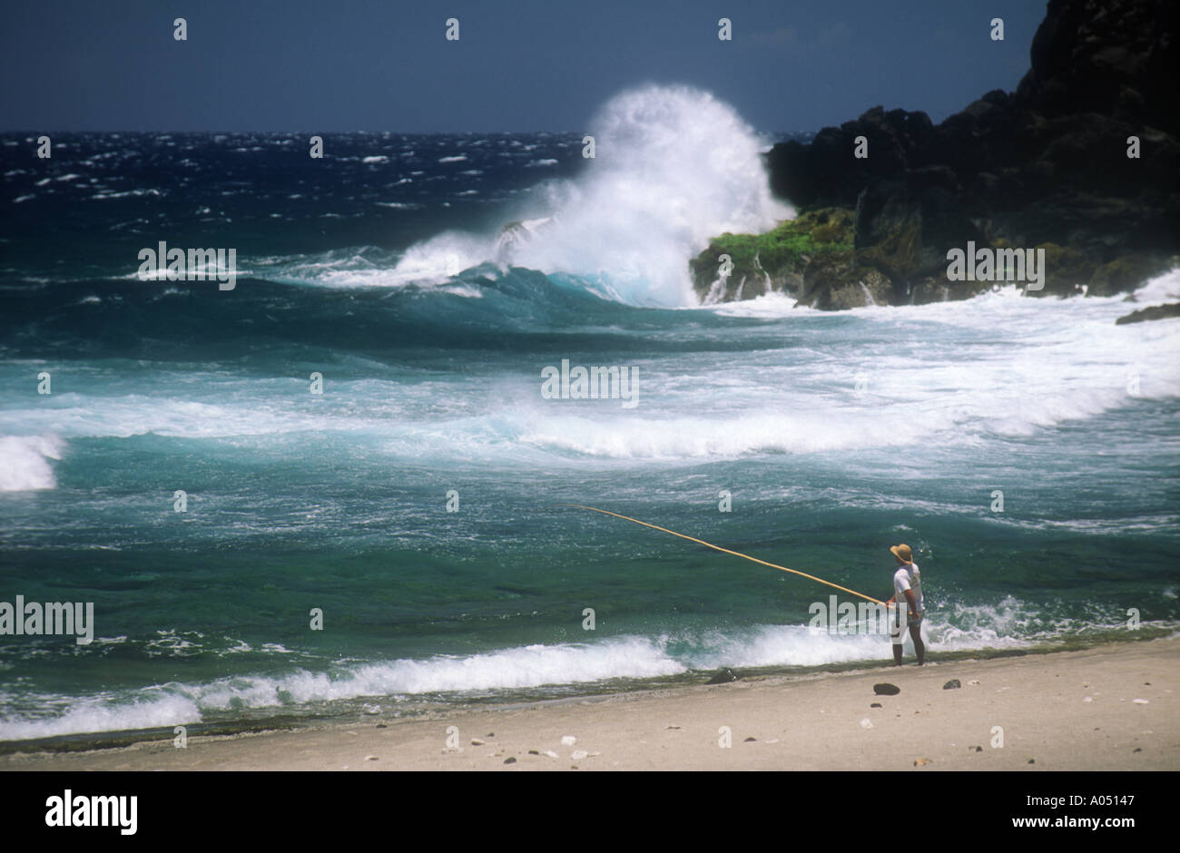 Fishing at the beach Stock Photo - Alamy