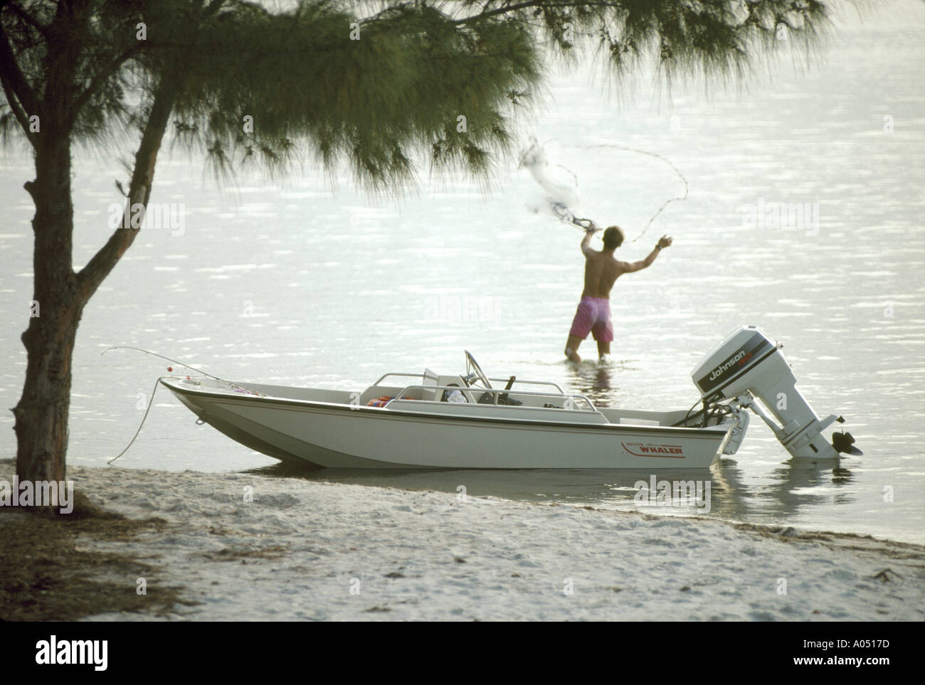 Children netting fish hi-res stock photography and images - Alamy