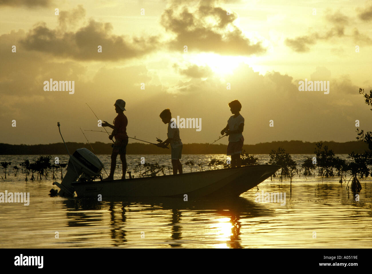 Kids fishing Stock Photo - Alamy