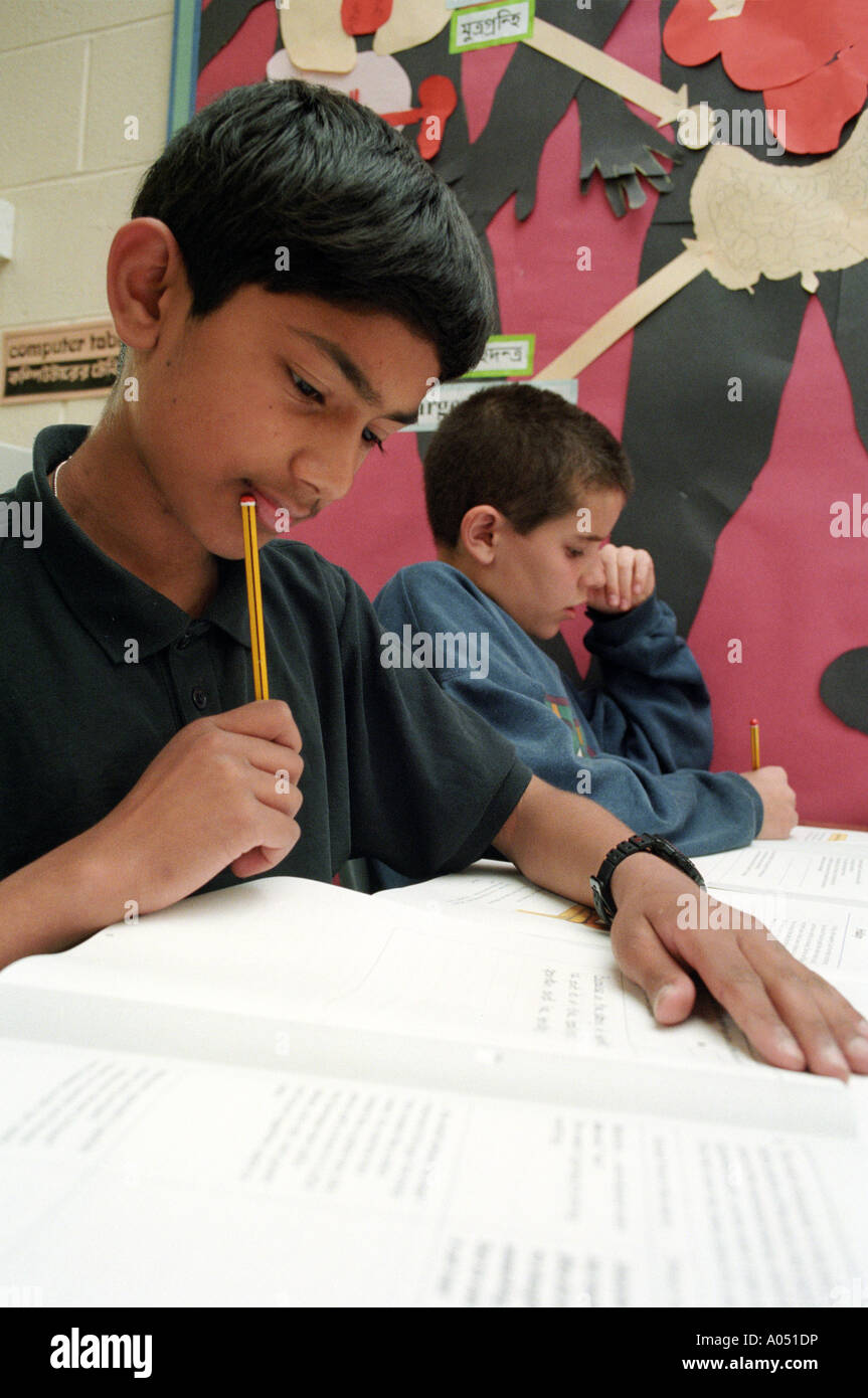 Asian/Indian boy studying in classroom Stock Photo - Alamy
