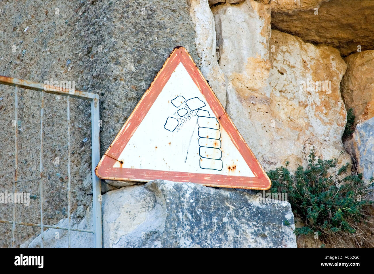 Quirky sign warning of falling brick and stone block masonry, in the ...