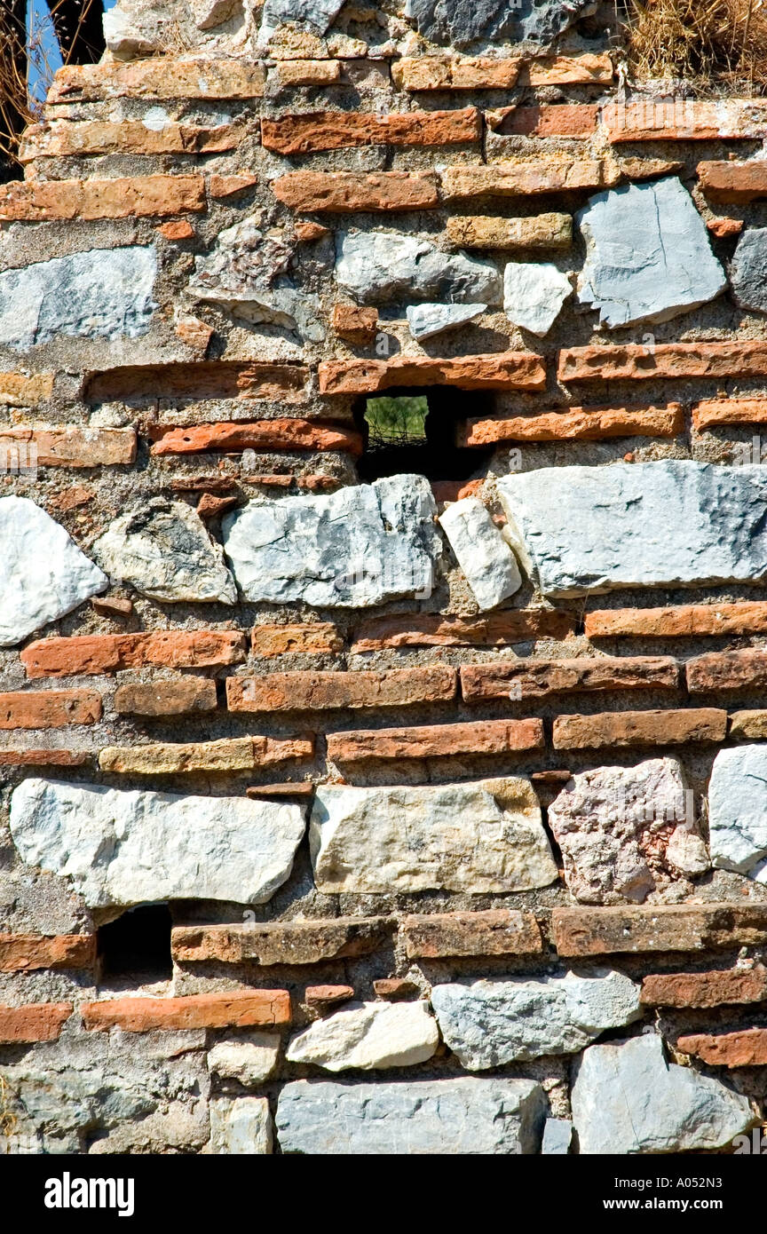 Terracotta brick and stone masonry wall detail, in the city of Ephesus ...
