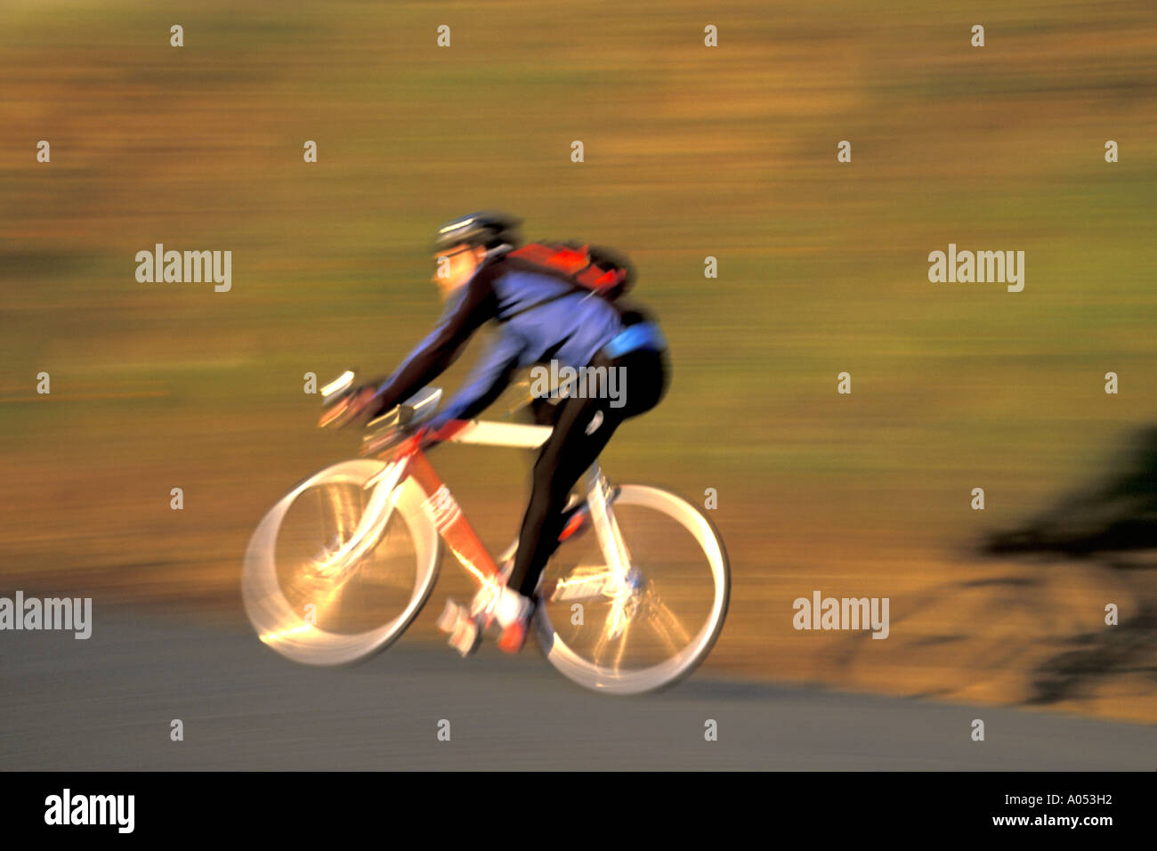 mountain biker riding bike fast Stock Photo - Alamy