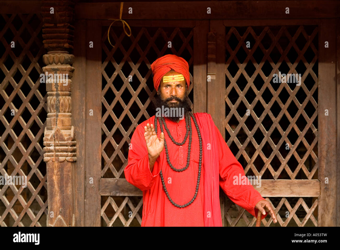 Religious Hindu costumed man in Durbar Square in center of village of ...
