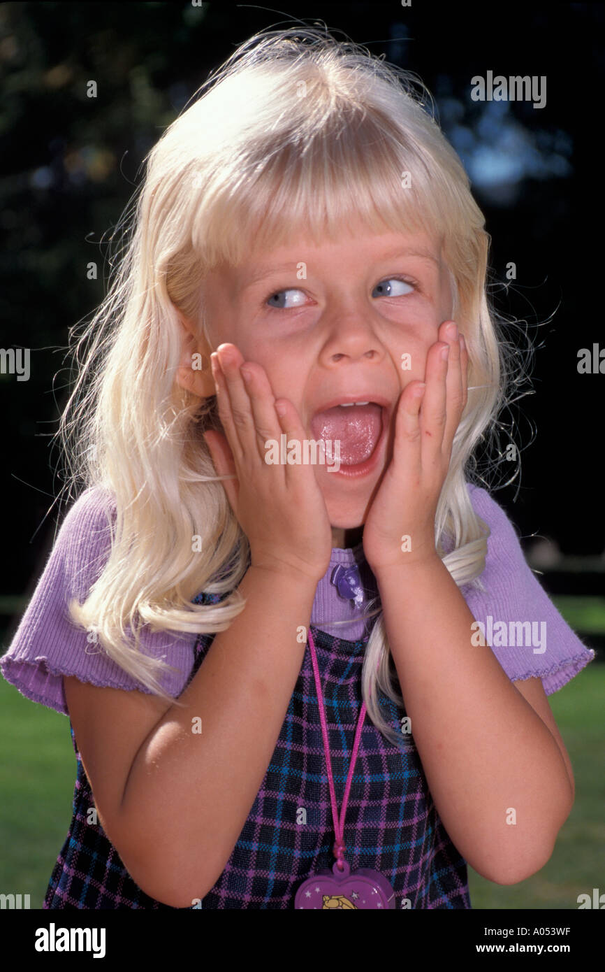 scared happy excited expression of the face of a little girl Stock ...