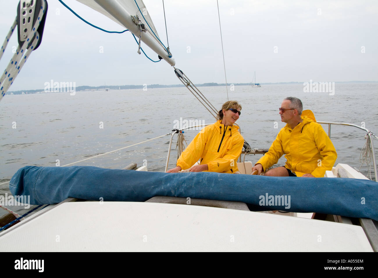 Yellow rain slickers hi-res stock photography and images - Alamy