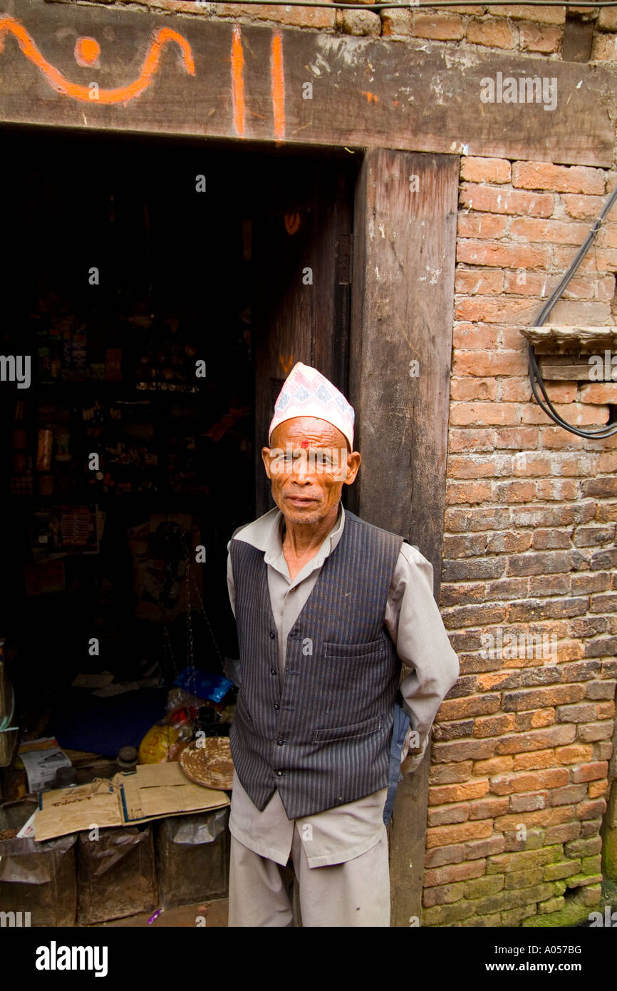 Local Hindu working man stopping near street in village of Bhaktapur a ...