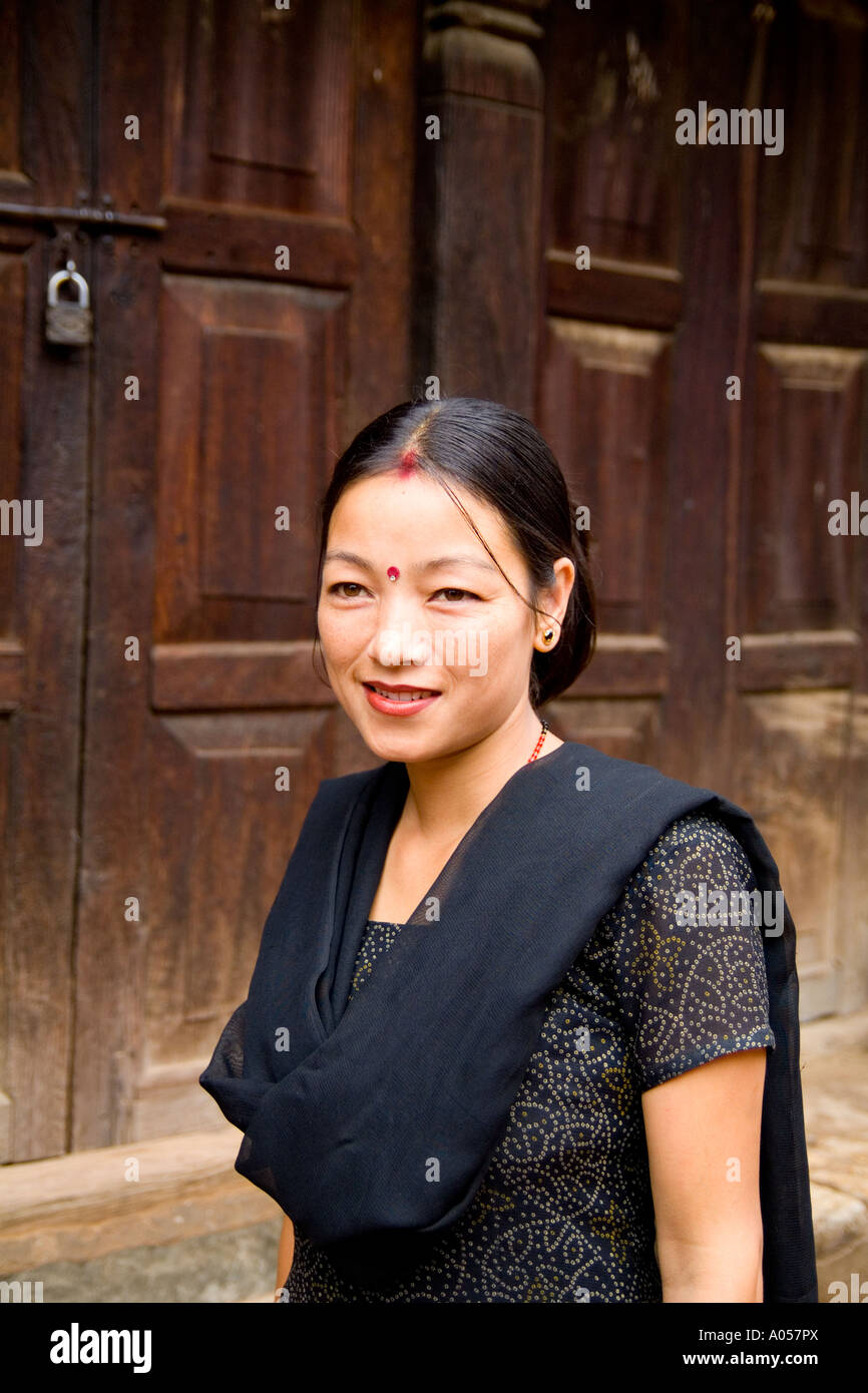 Beautiful portrait of modern portrait for cover of local Nepal woman in village of Bhaktapur a ...