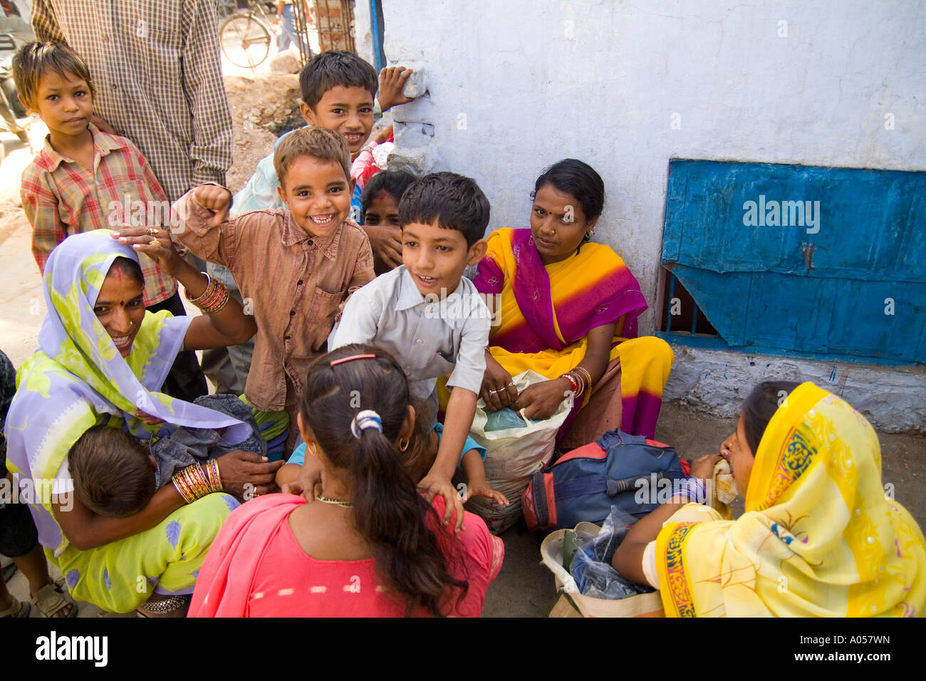 Children and parents talking in group in small village of Shahpura in ...