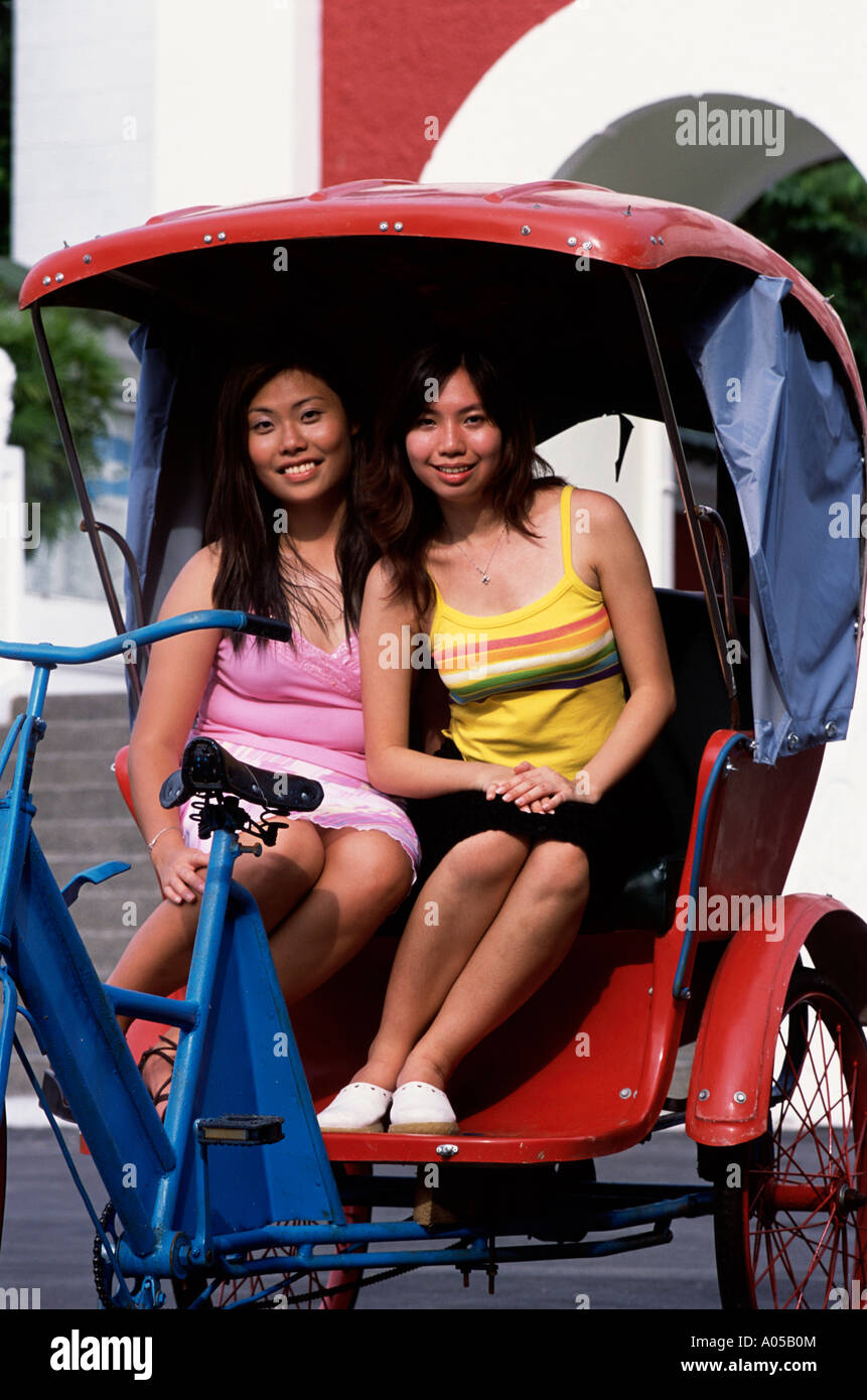 Singapore, Rickshaw & Local Girls Stock Photo - Alamy