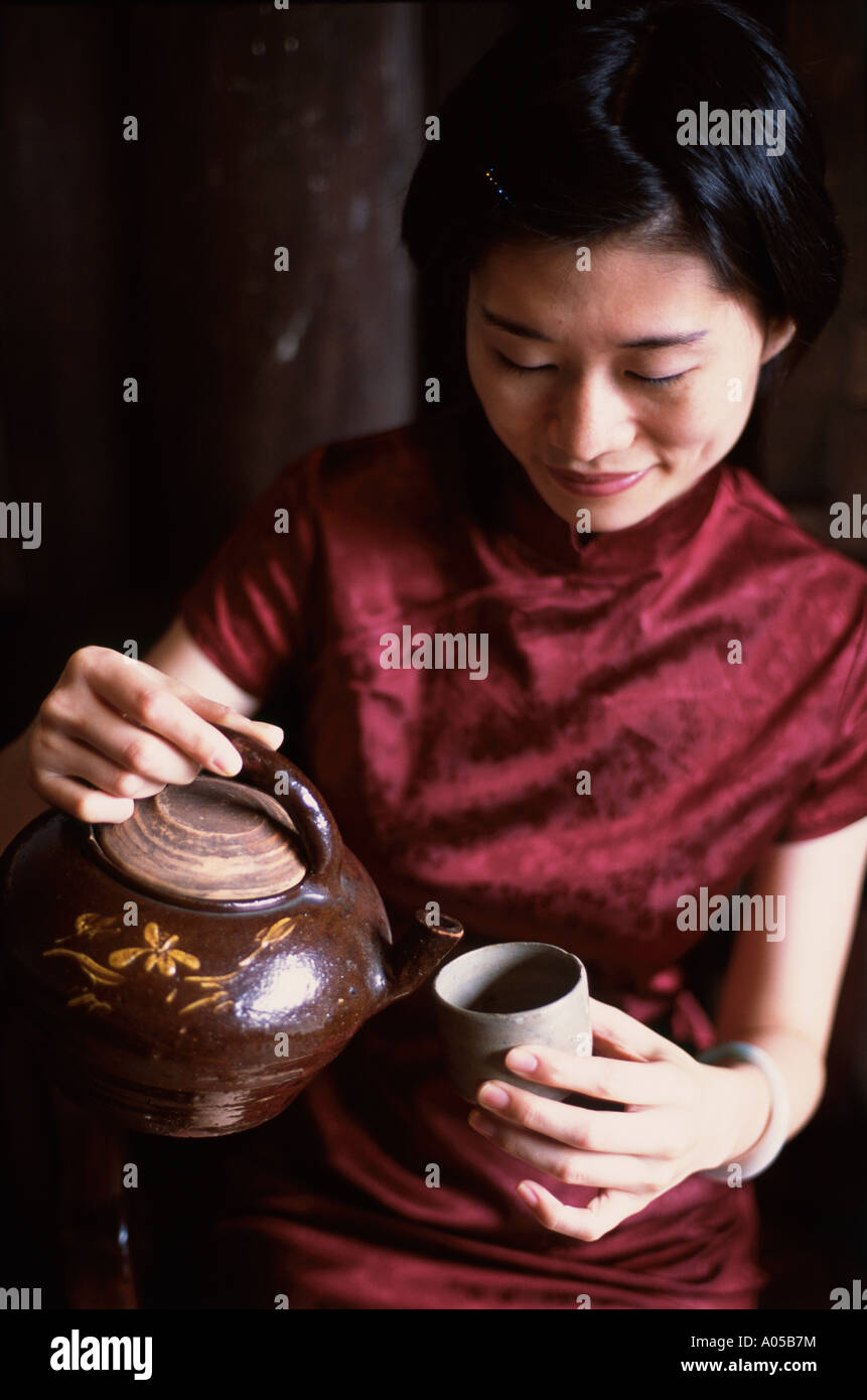 People, Woman Serving Chinese Tea Stock Photo - Alamy