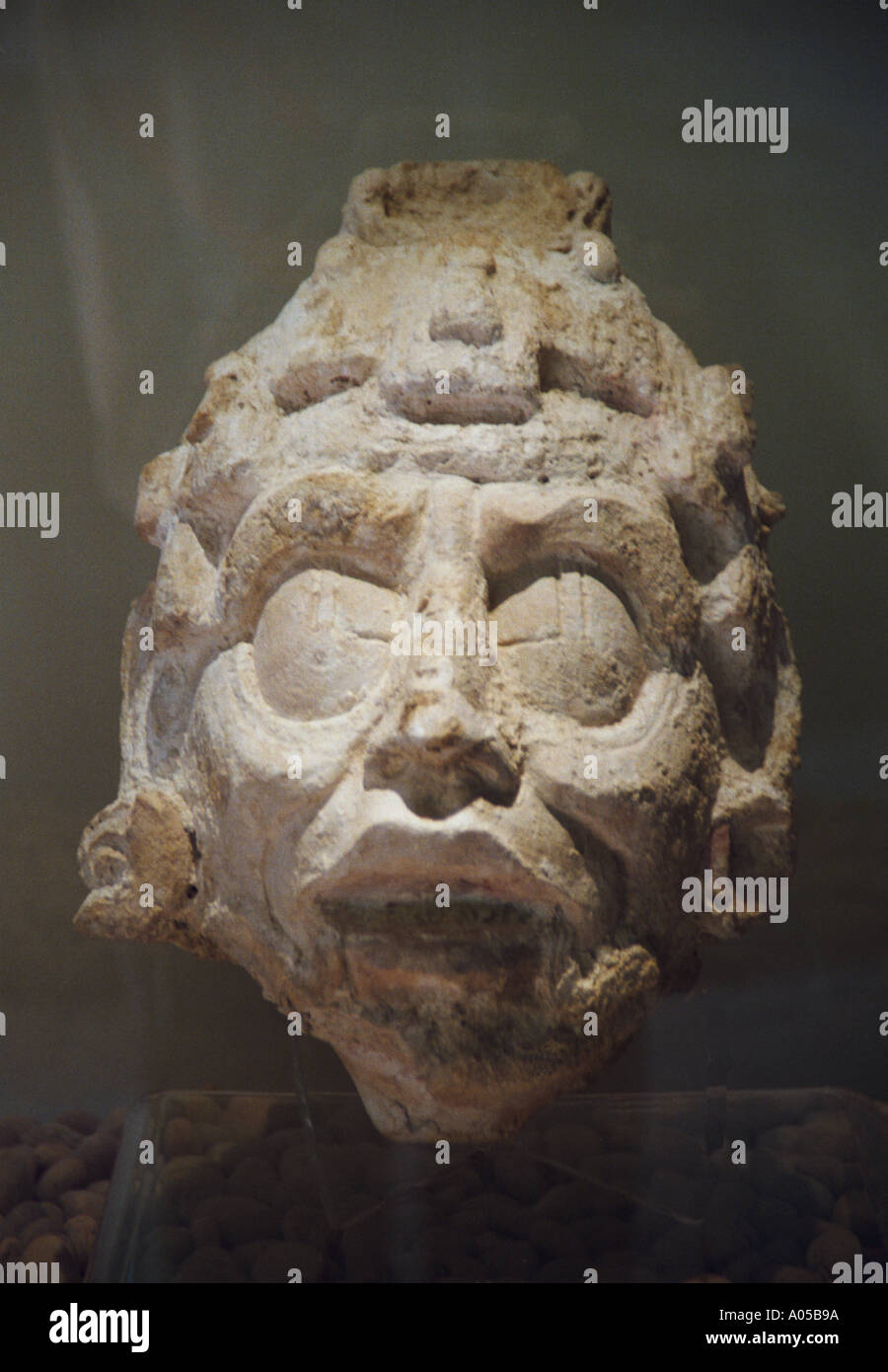Carved stone face at the Mayan ruins of Palrnque Chiapas Mexico Stock ...