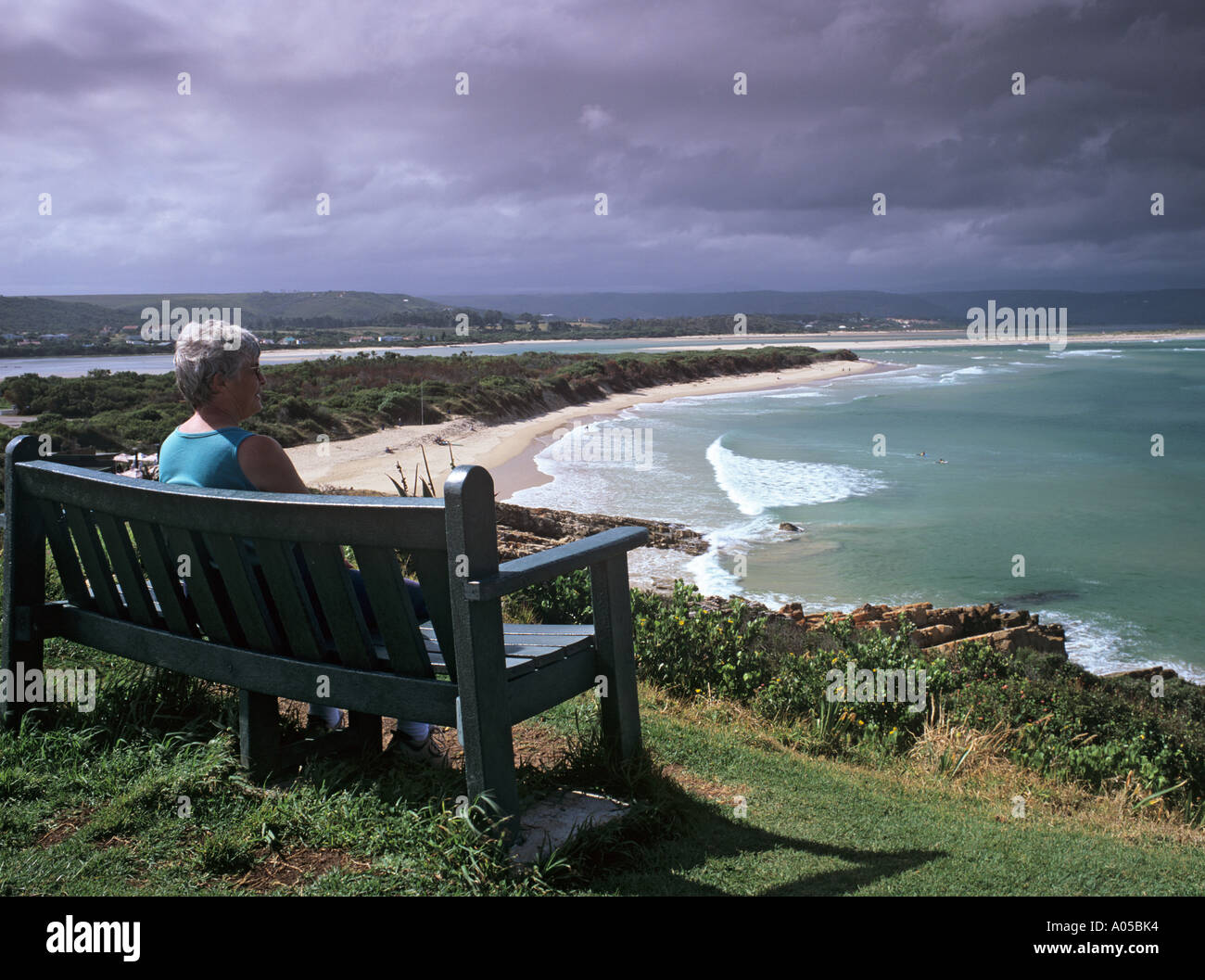 BENCH on LOOKOUT ROCKS and woman looking down on Lookout Beach with a ...