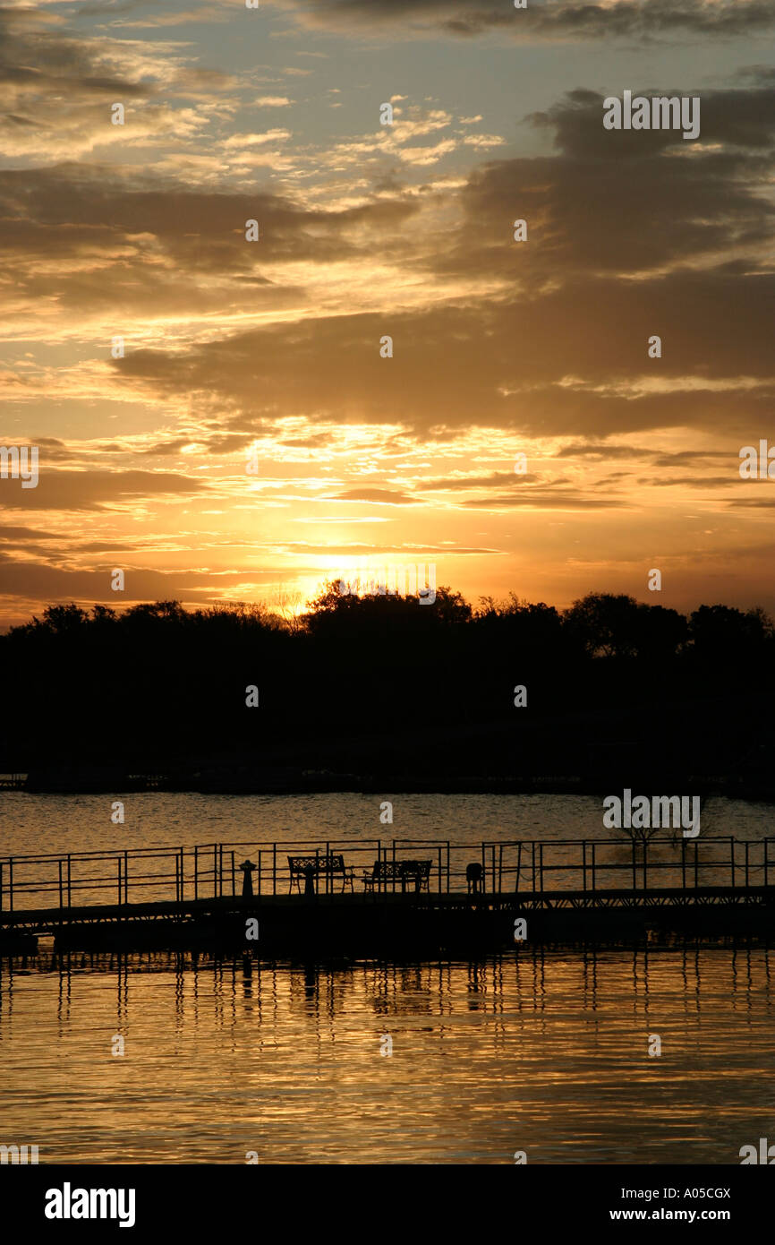 Dock walkway during sunrise on Lake Travis Stock Photo - Alamy
