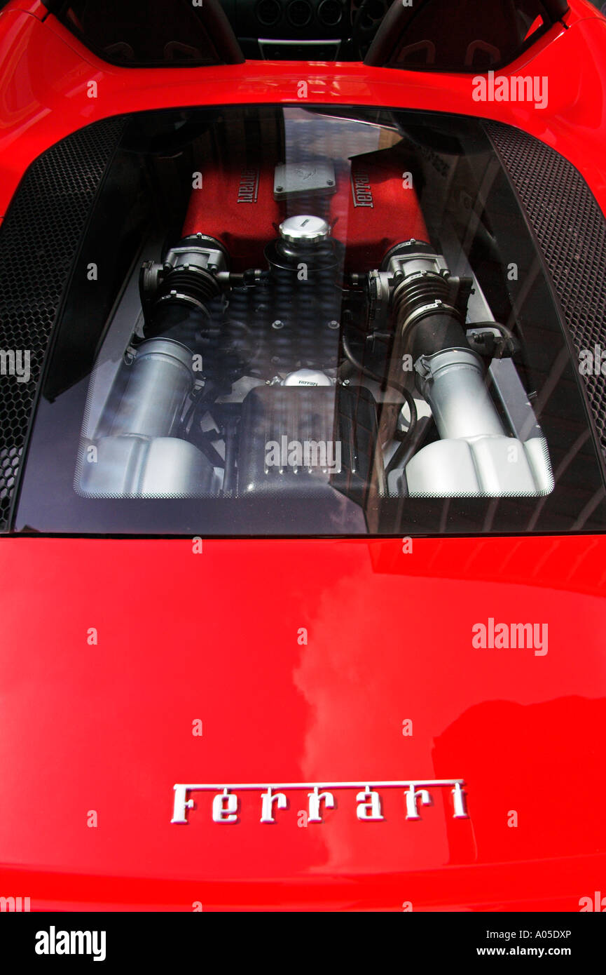 Ferrari V8 engine seen through the transparent engine cover Stock Photo ...