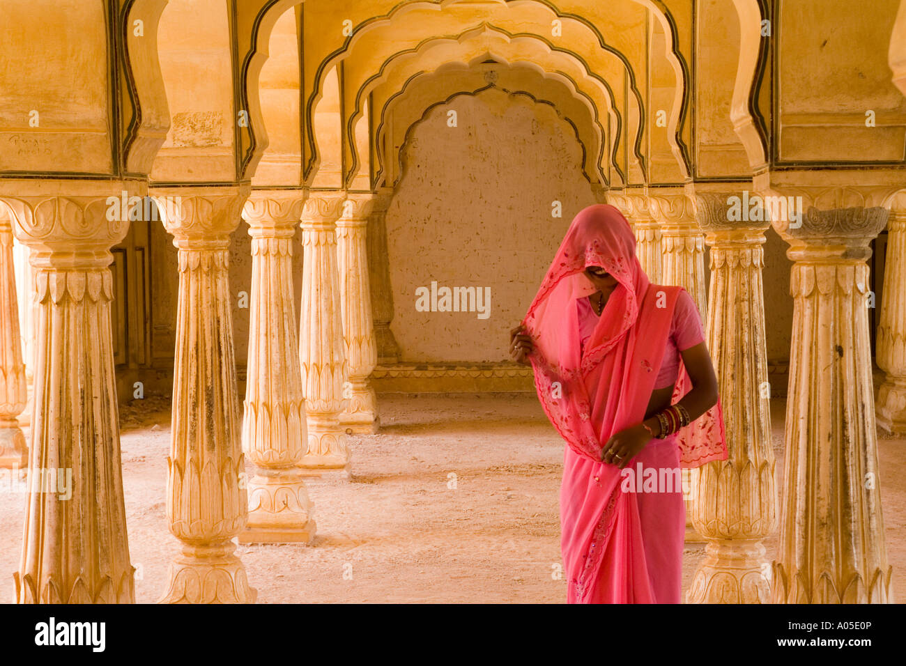 Beautiful graphic arches with colorful Hindu gentle woman posed at ...