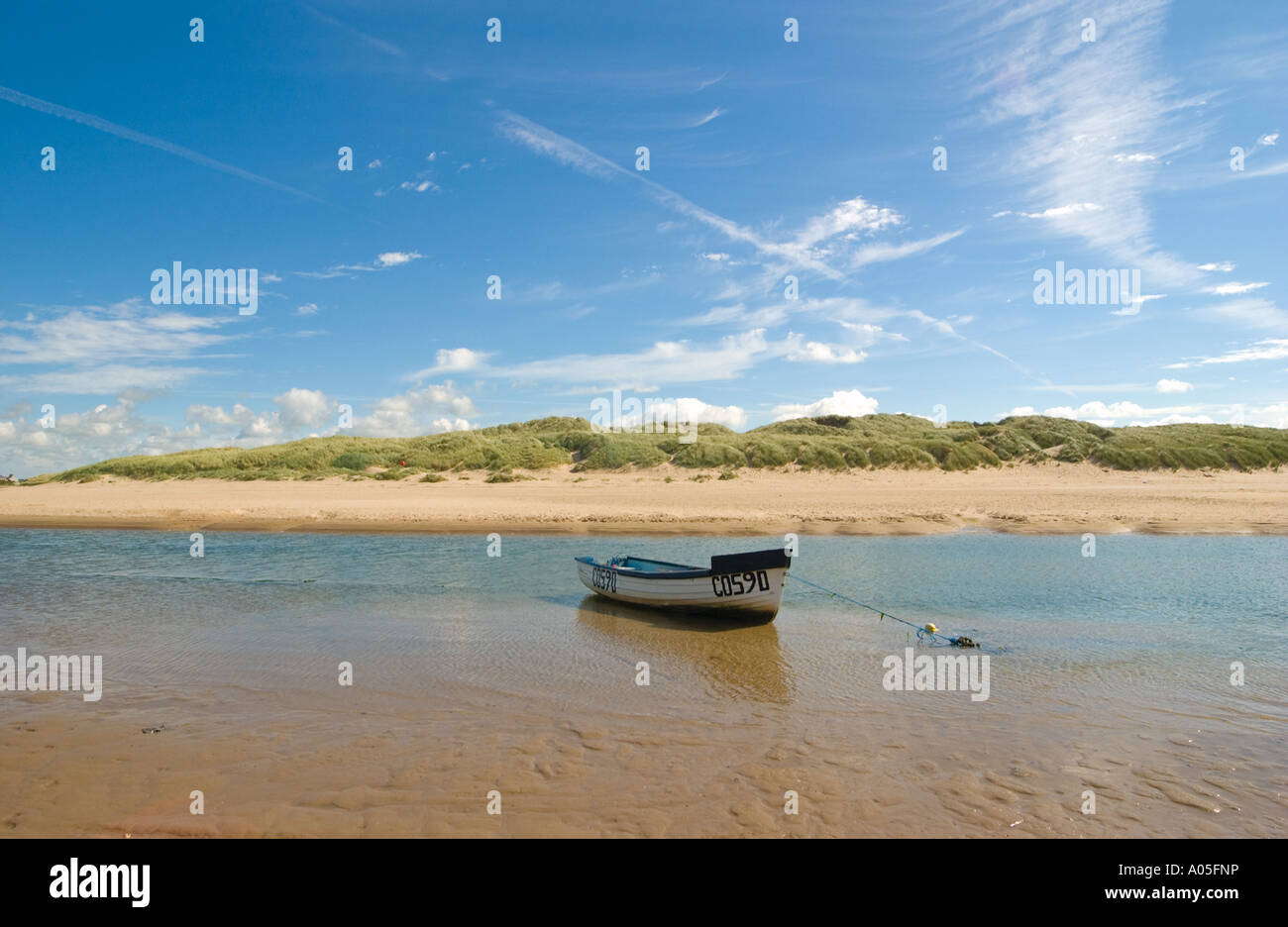 Boat on Beach Aberffraw Bay Angelsey North West Wales Stock Photo - Alamy