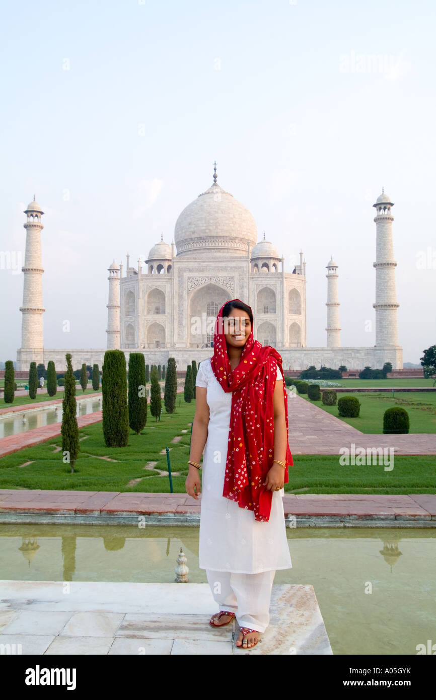 Hindu woman with colorful sari veil in the quiet peaceful Taj Mahal one ...