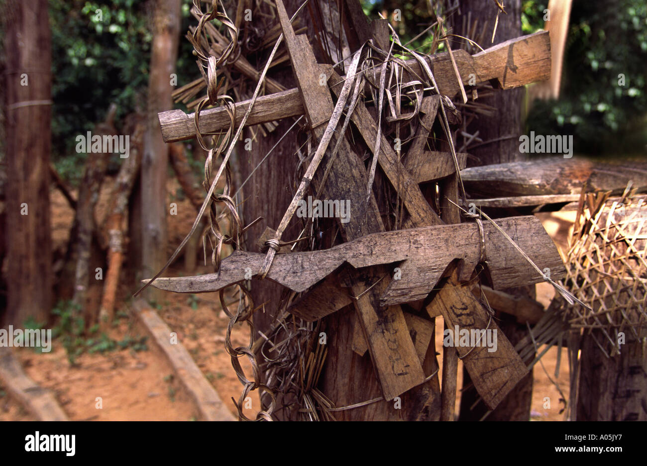 Wooden guns adorn an Akha spirit gate, to ward off evil. Muang Sing ...
