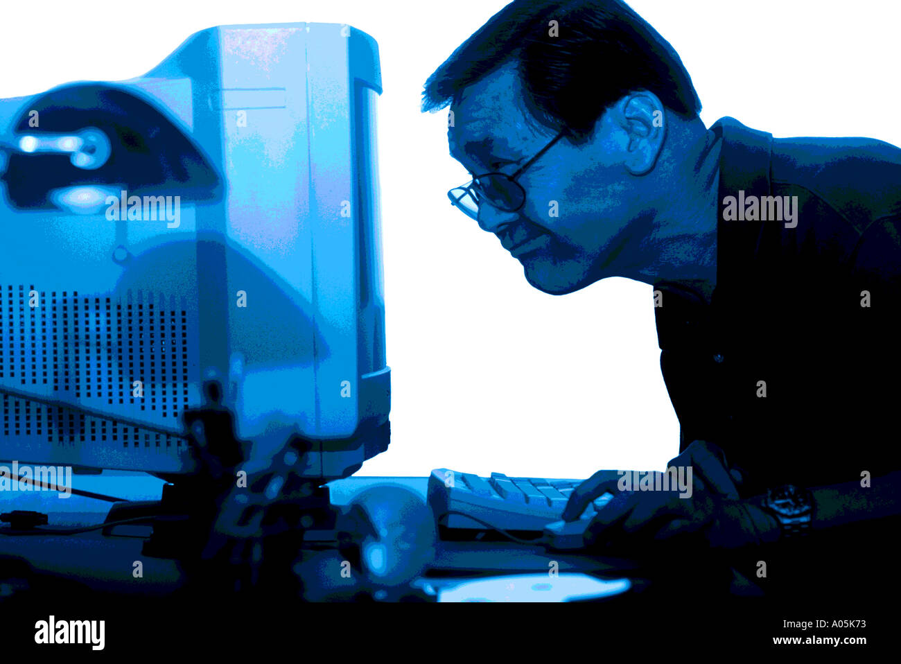 Asian man squinting computer screen hi-res stock photography and images ...