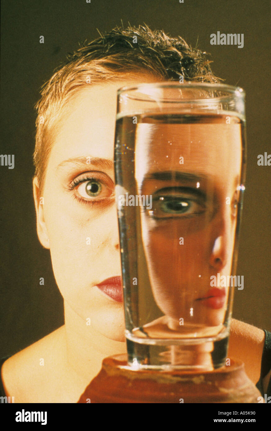 Eye face distortion glasses hi-res stock photography and images - Alamy