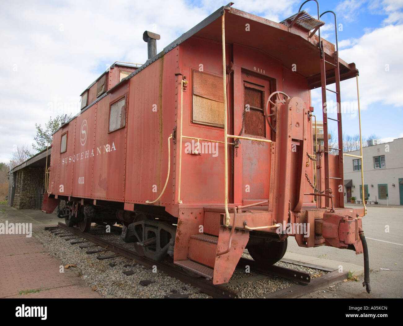 Old railroad car on a section of track Stock Photo - Alamy