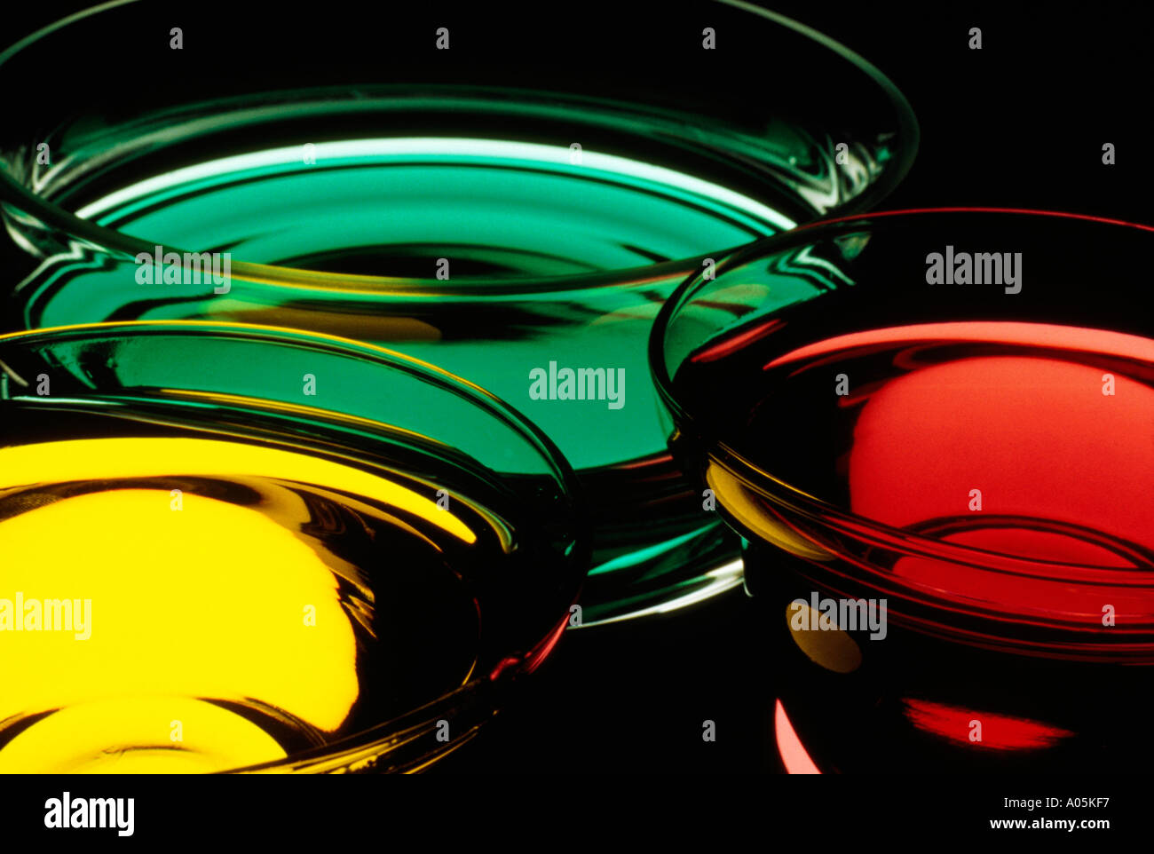 Still life of containers filled with red yellow and green fluid The ...