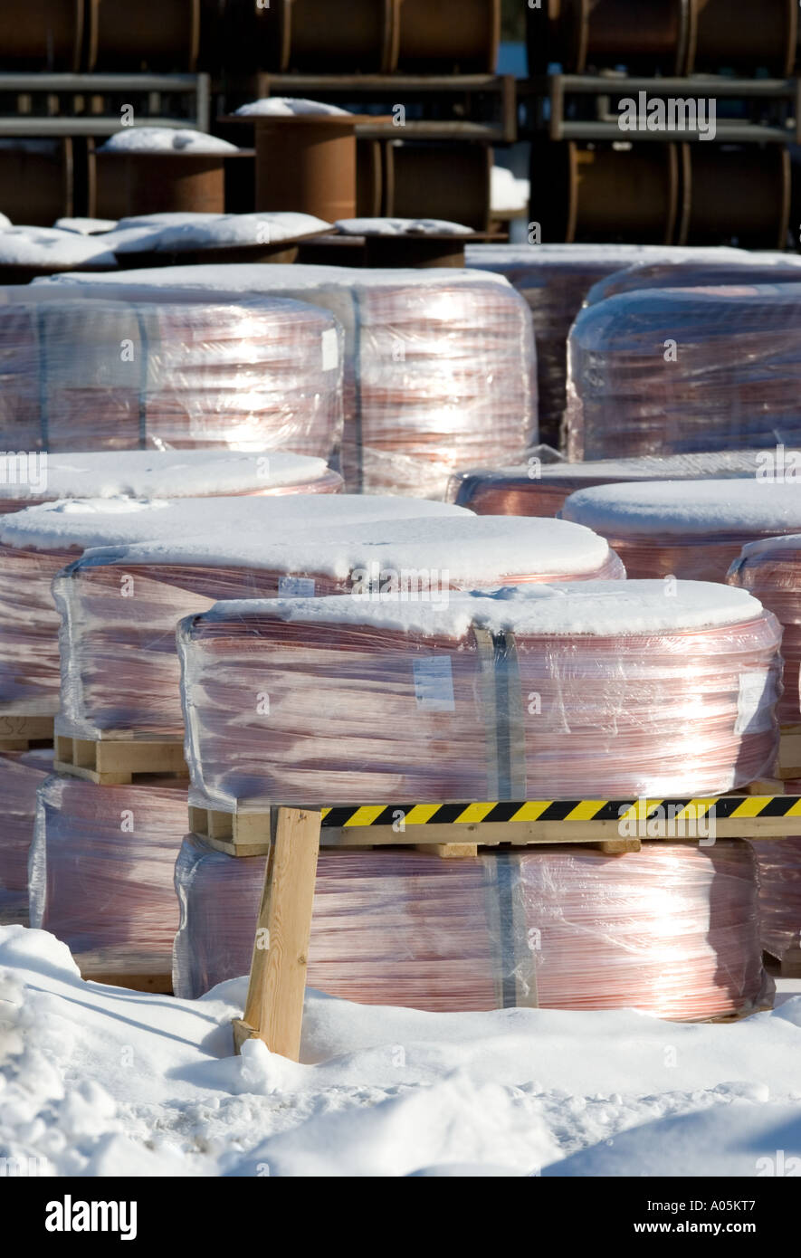 Inventory of copper cable rolls stored outside in snow , Finland Stock ...