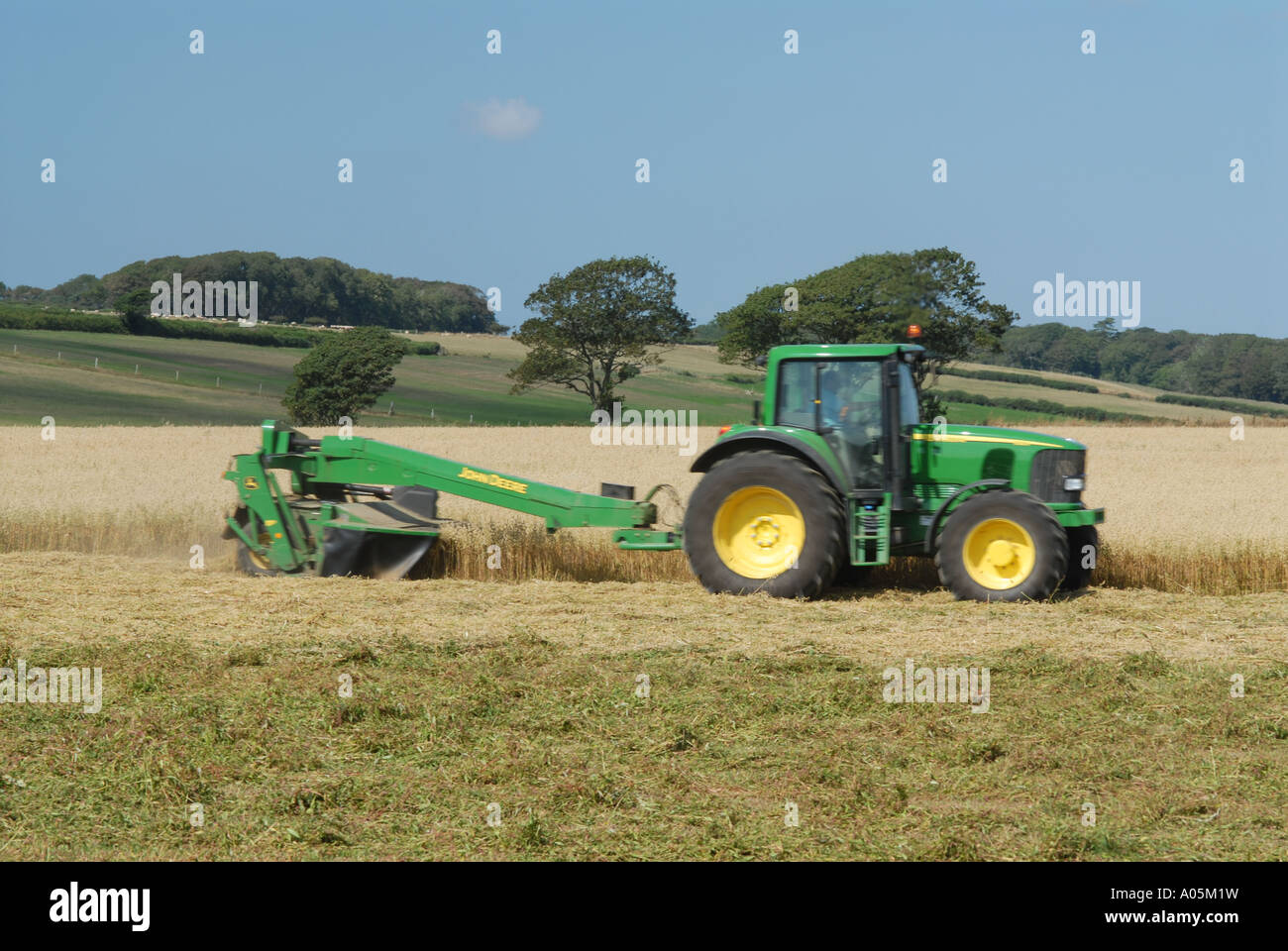 Tractor and Farming Equipment Hay Cutting Agriculture Wales Stock Photo ...