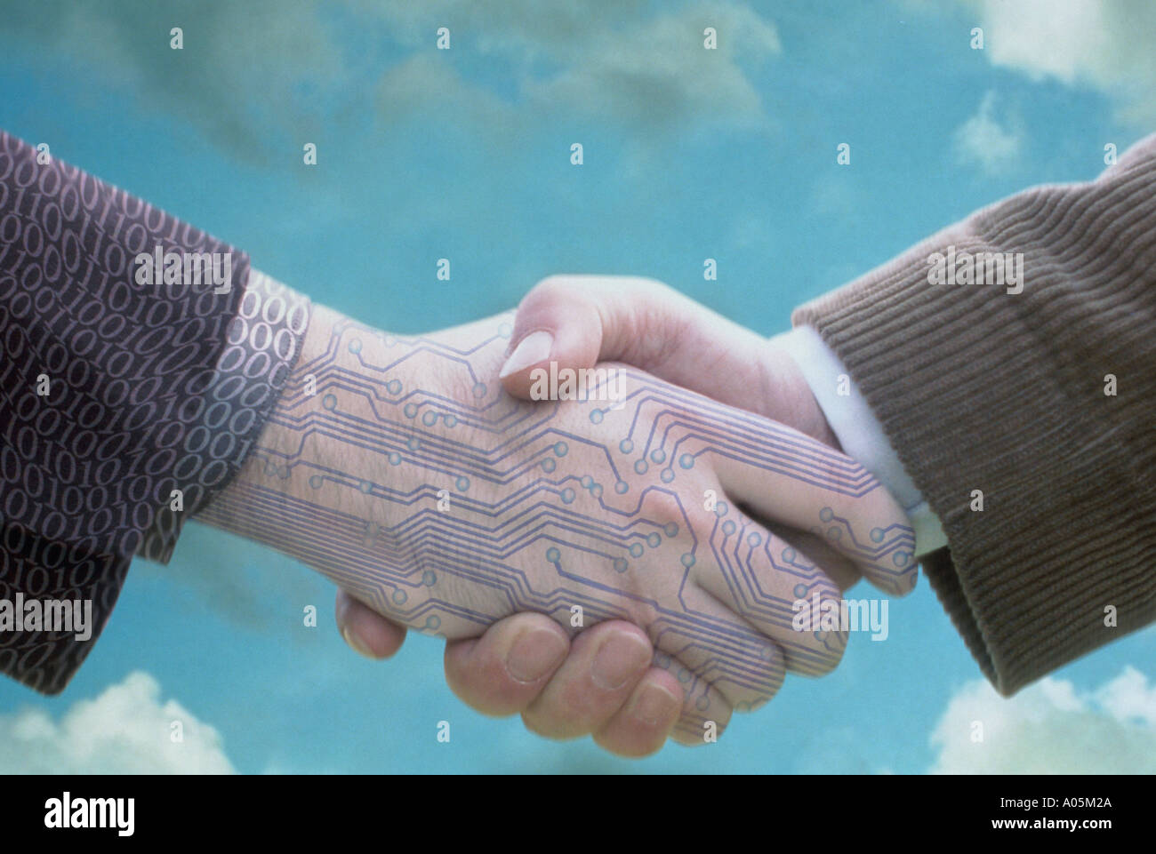 Computer generated image of a man hand shaking hands with a digital ...