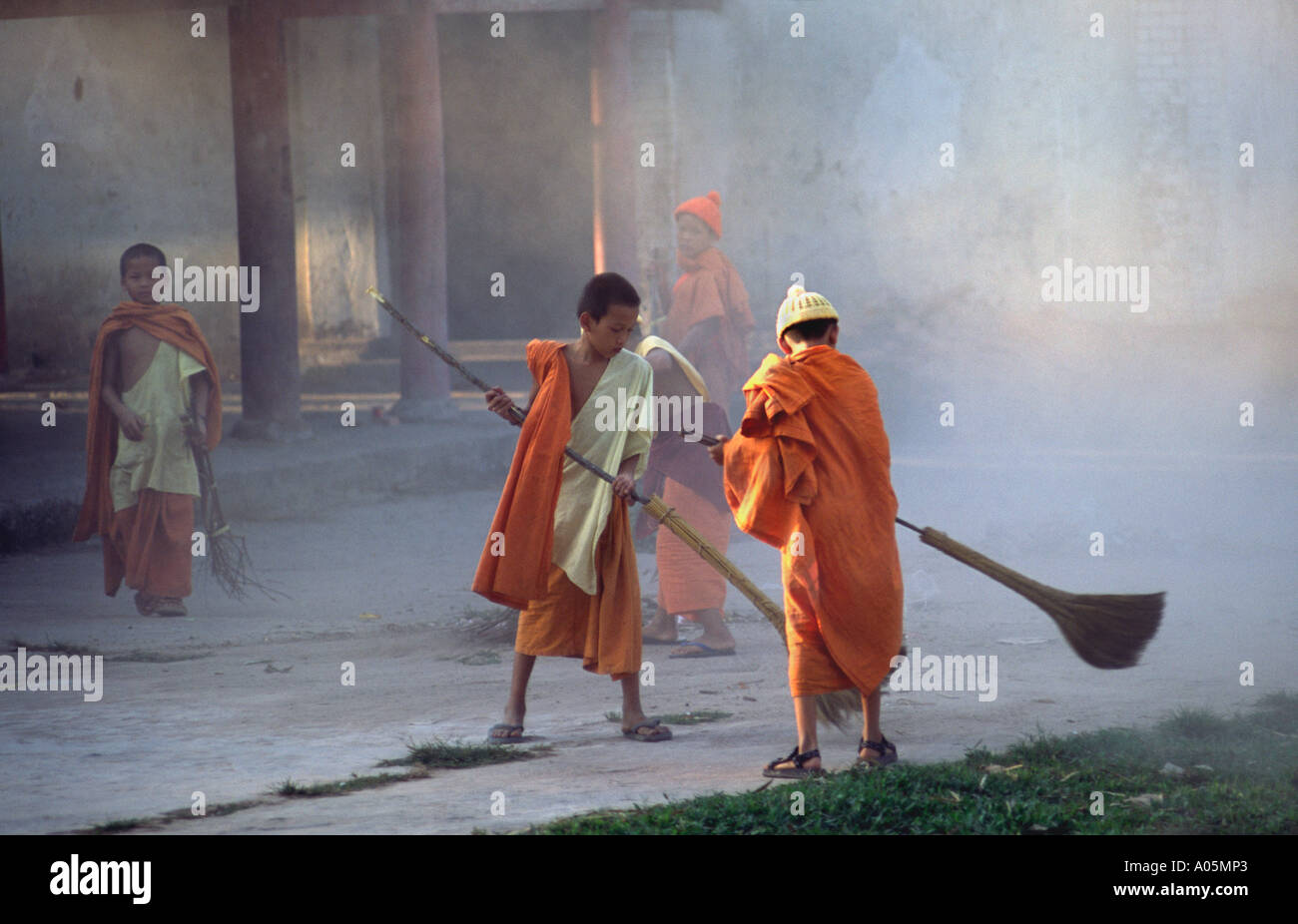 Novice monks cleaning temple laos hi-res stock photography and images ...