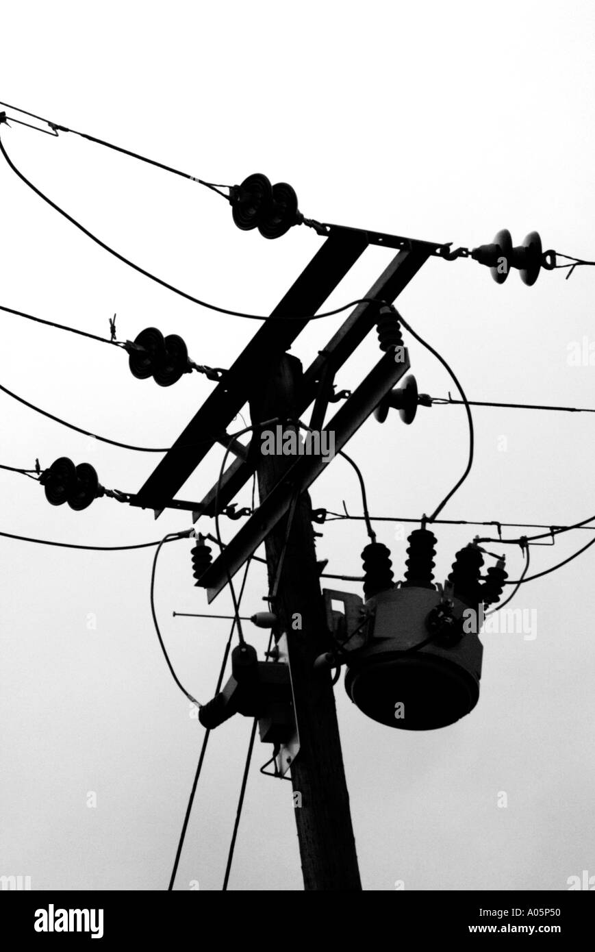 Post carrying step down transformer and electric cables Stock Photo - Alamy
