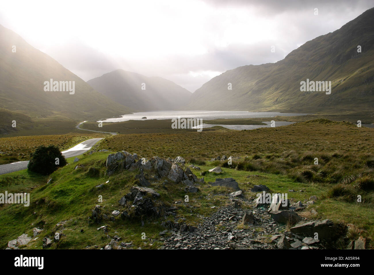 Ireland County Mayo Mweelrea Mountains rays of sunlight over Doo Lough ...