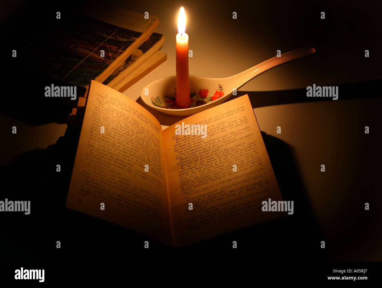 Reading by candlelight hi-res stock photography and images - Alamy
