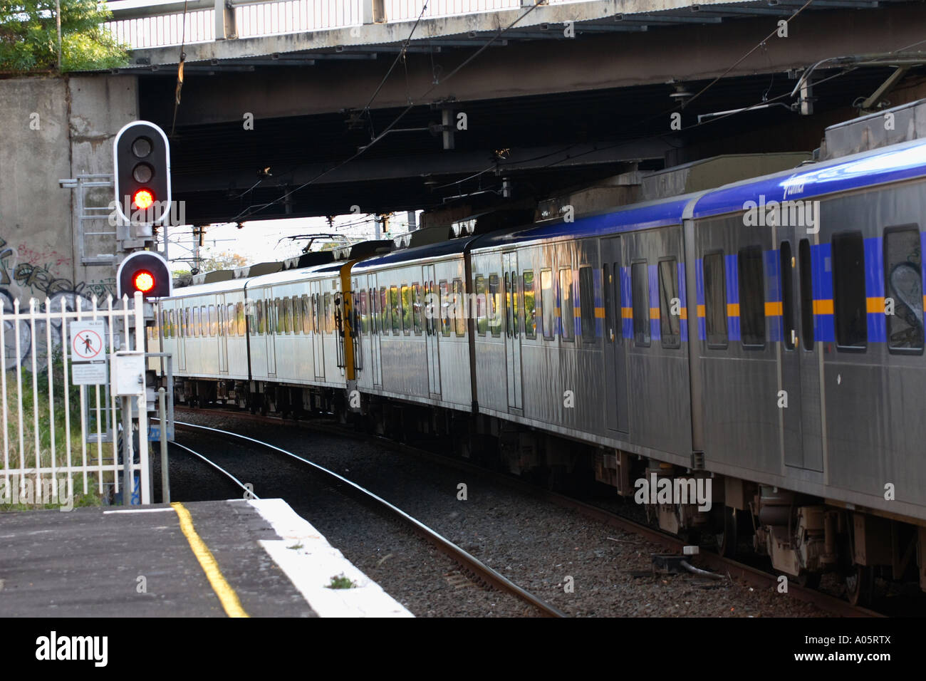 Train leaving the station Stock Photo - Alamy