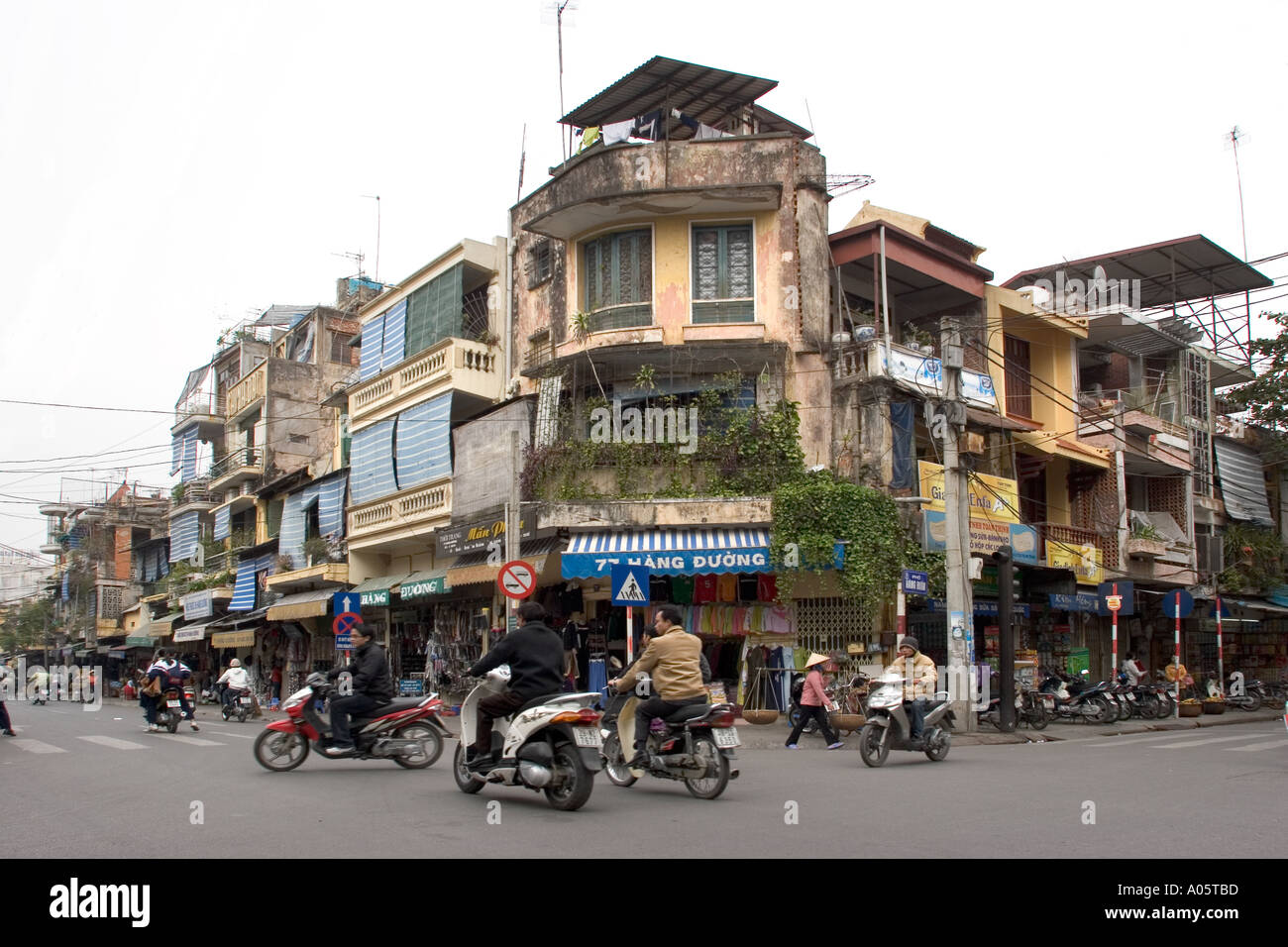 Vietnam Hanoi Centre Old Quarter architecture buildings at busy road ...